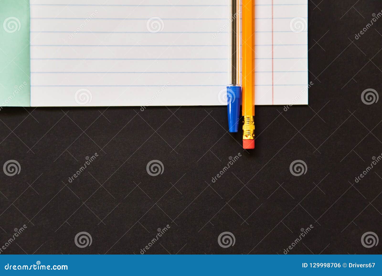 Exercise book with pencil. stock photo. Image of educate - 129998706