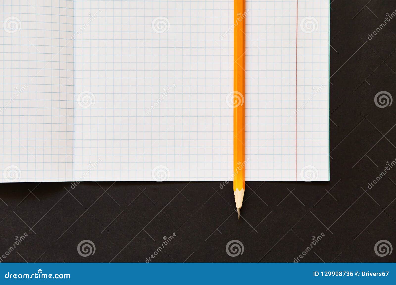 Exercise book with pencil. stock photo. Image of card - 129998736