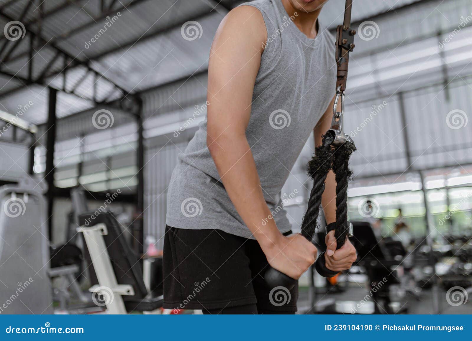 Exercise Concept The Hefty Man With His Grey Sport Top And Black Pants ...