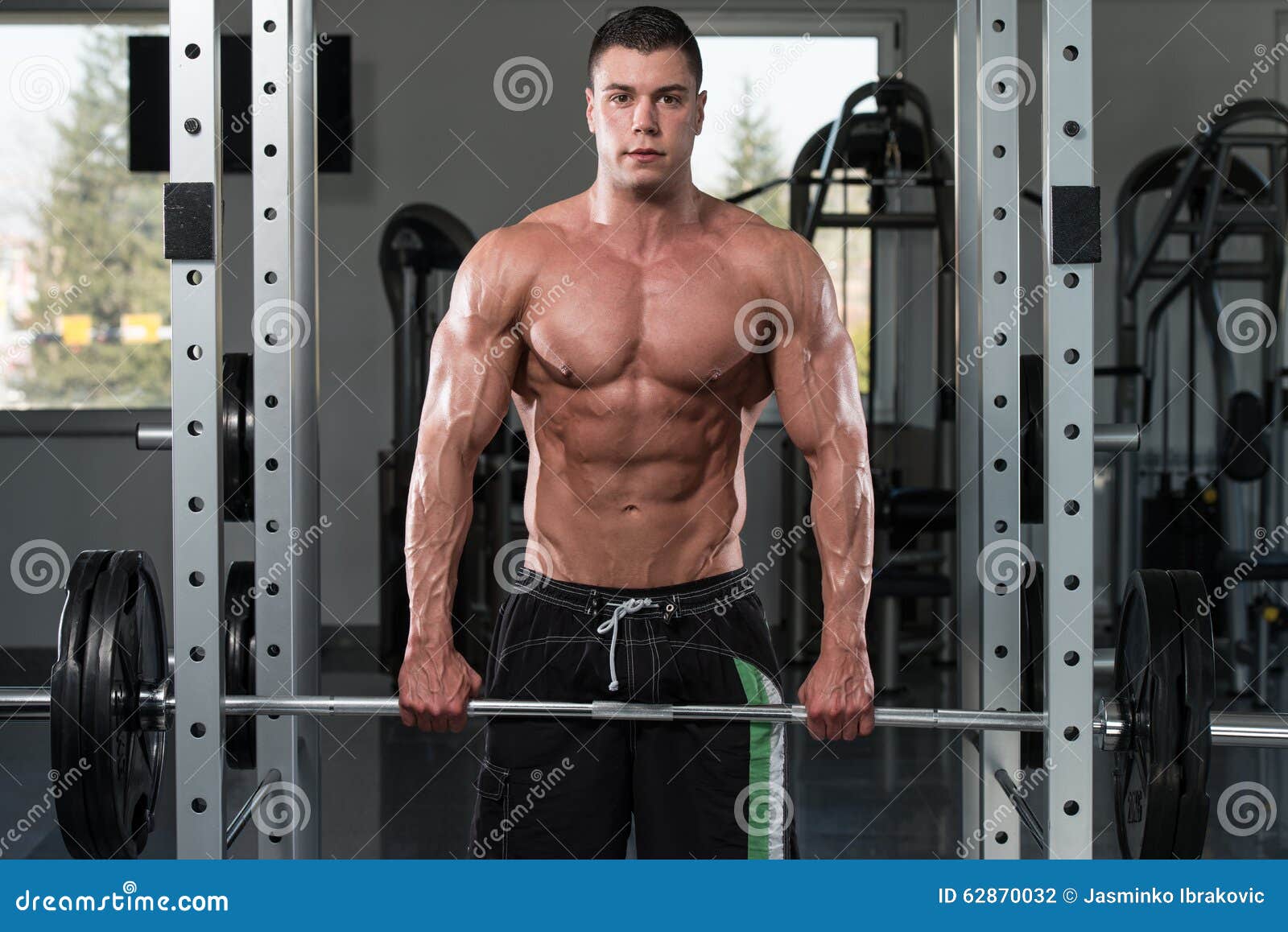 Exercise for Trapezius with Barbell Stock Photo - Image of build ...