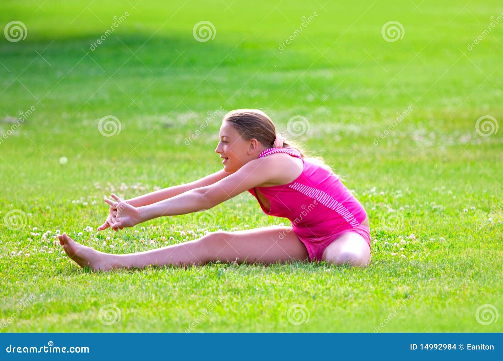 Exercises on the grass stock photo. Image of relaxation - 14992984