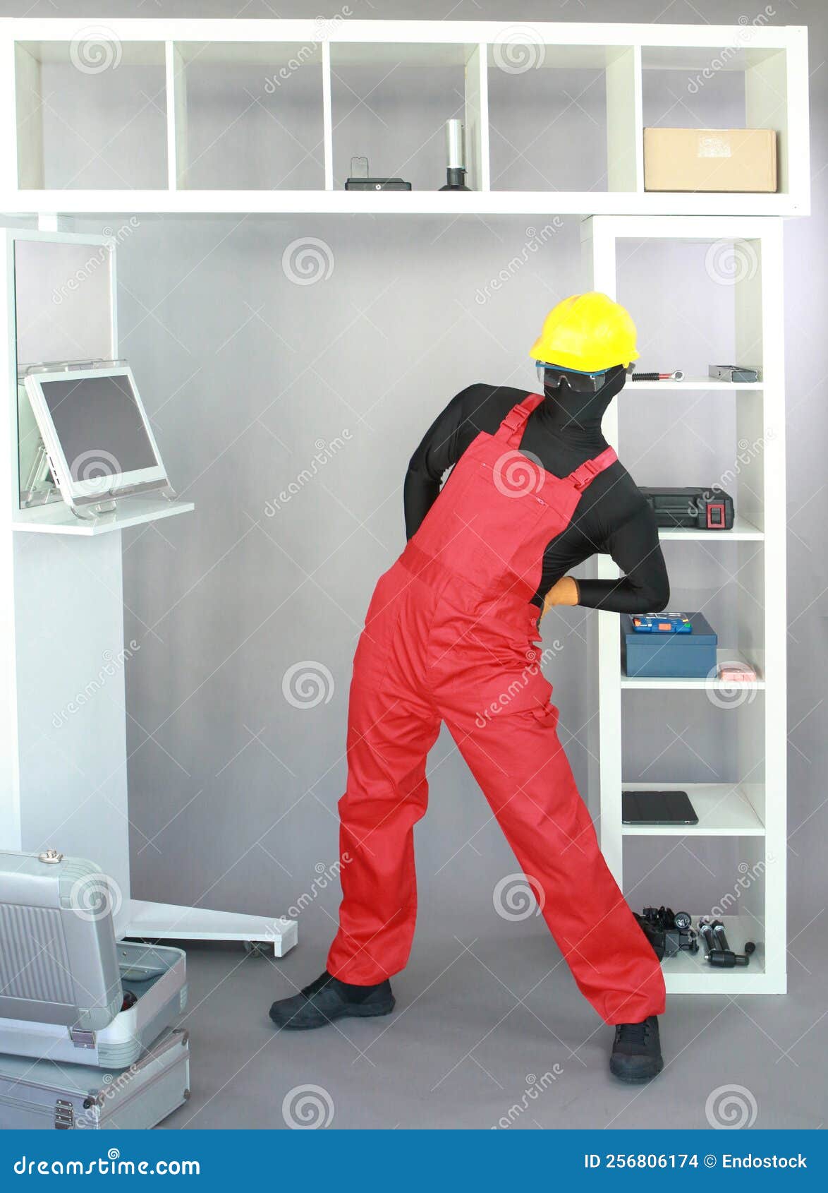 Worker Stretching Back in the Industrial Environment. Stock Photo ...