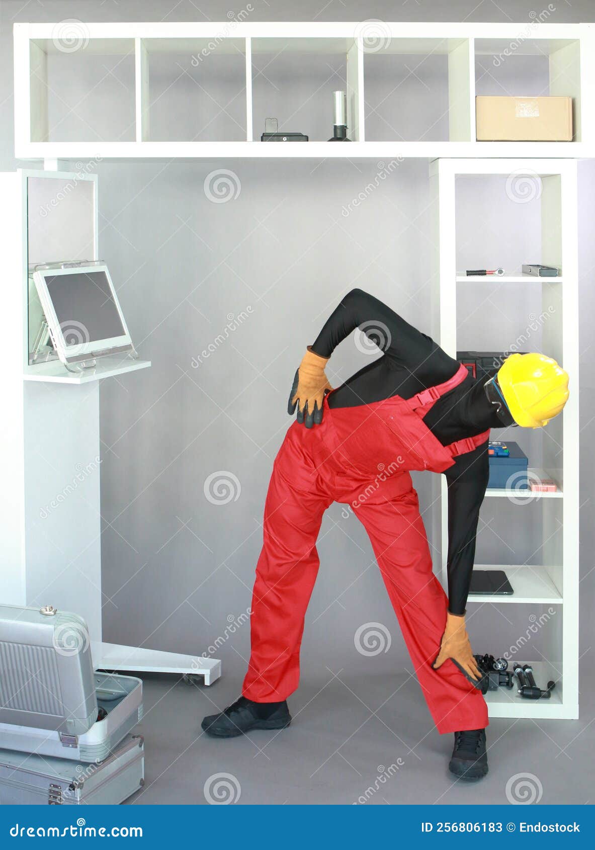 Worker Stretching Back in the Industrial Environment. Stock Image ...