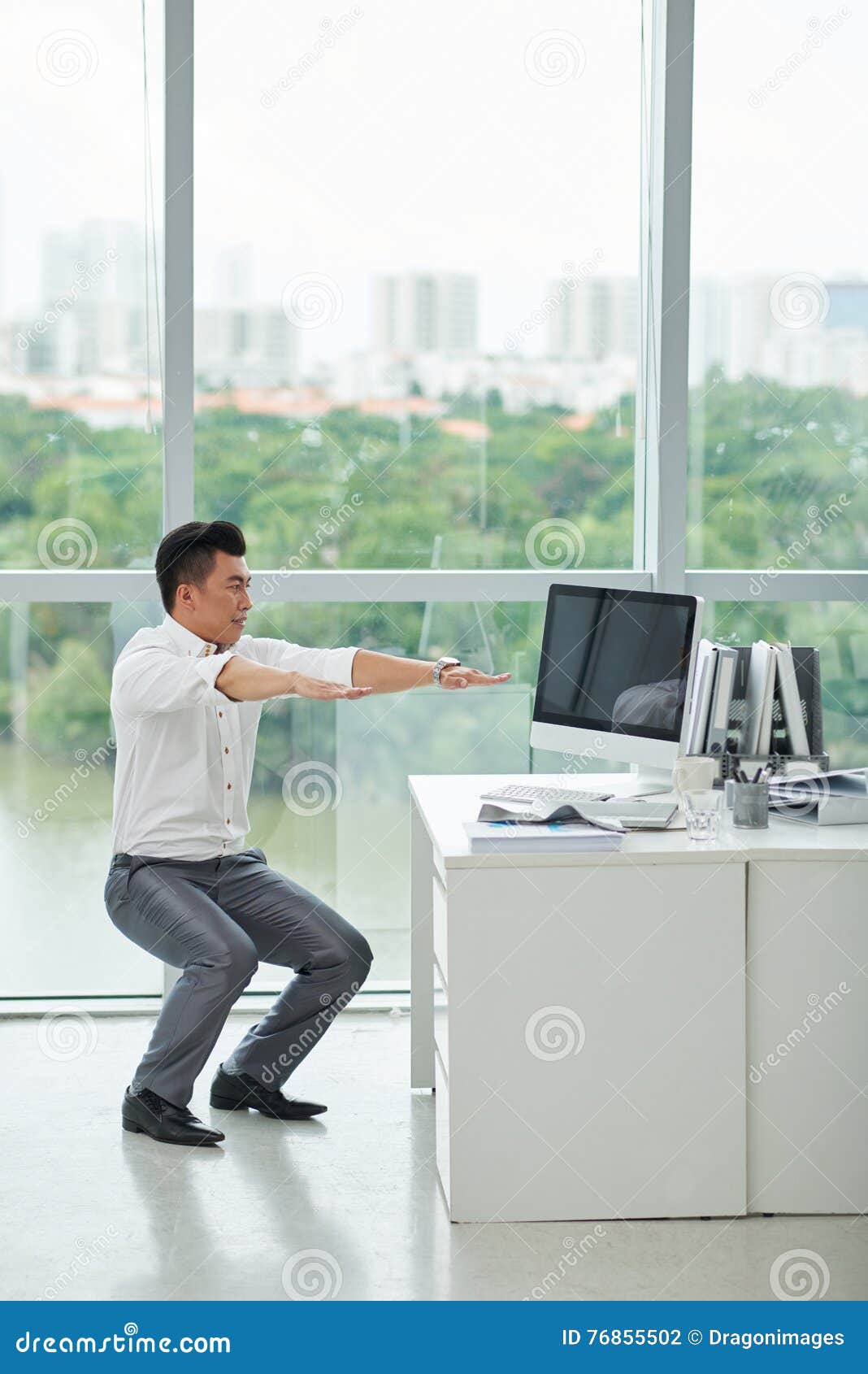 Exercising businessman stock photo. Image of break, squat - 76855502