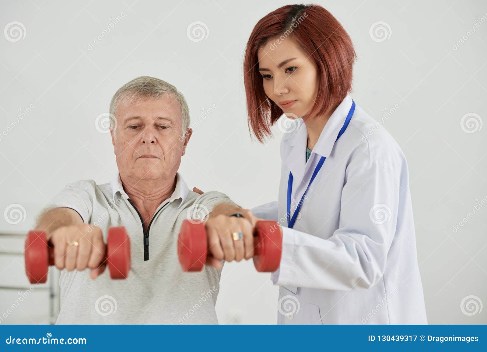 Exercising with doctor stock image. Image of recovering - 130439317