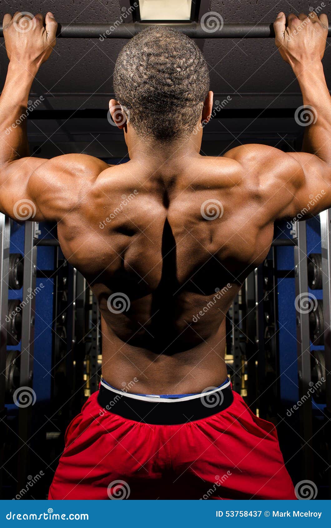 Exercising in Dramatic Light Stock Image - Image of male, motivational ...