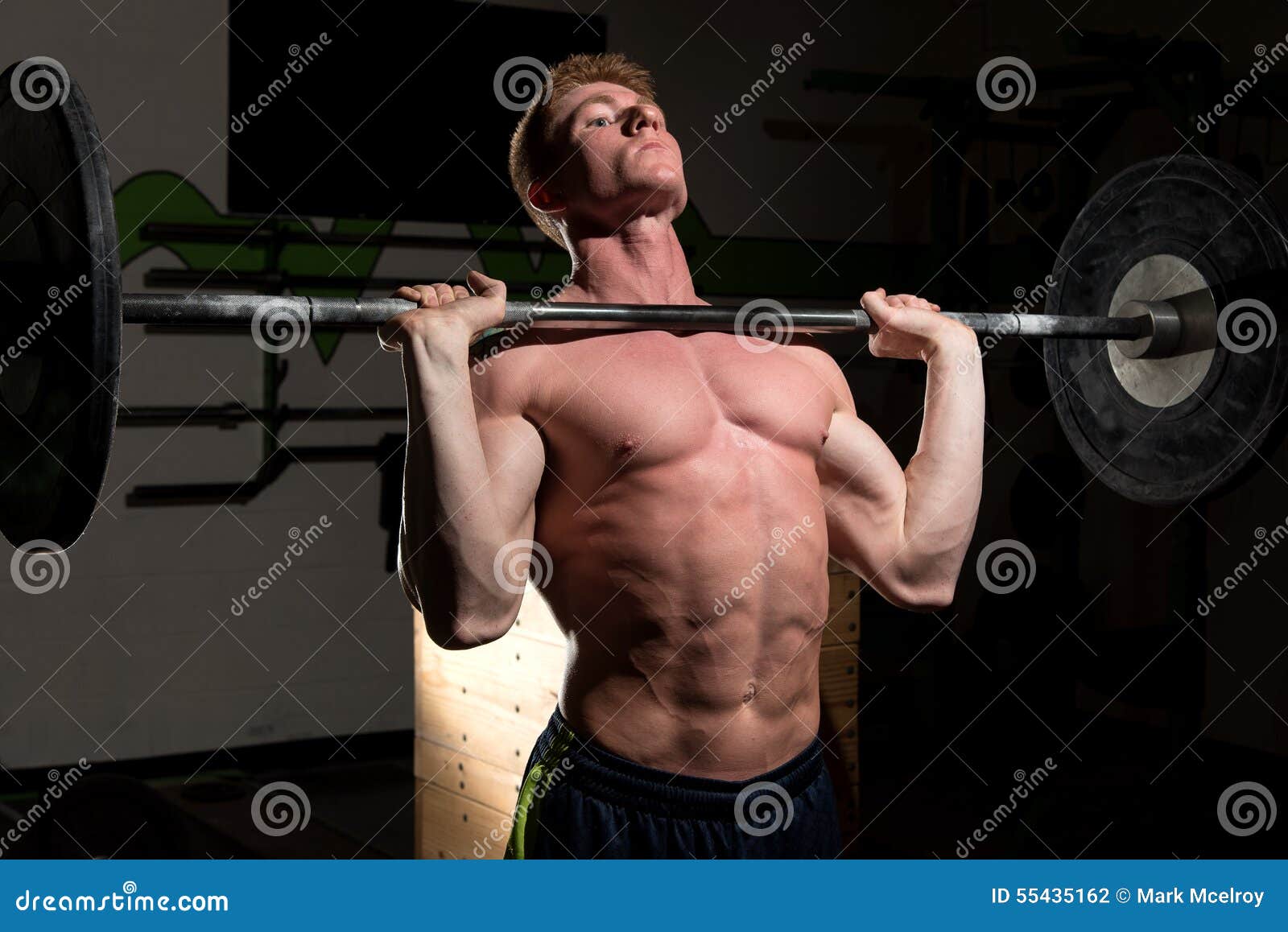 Exercising in Dramatic Light Stock Photo - Image of hard, motivated ...