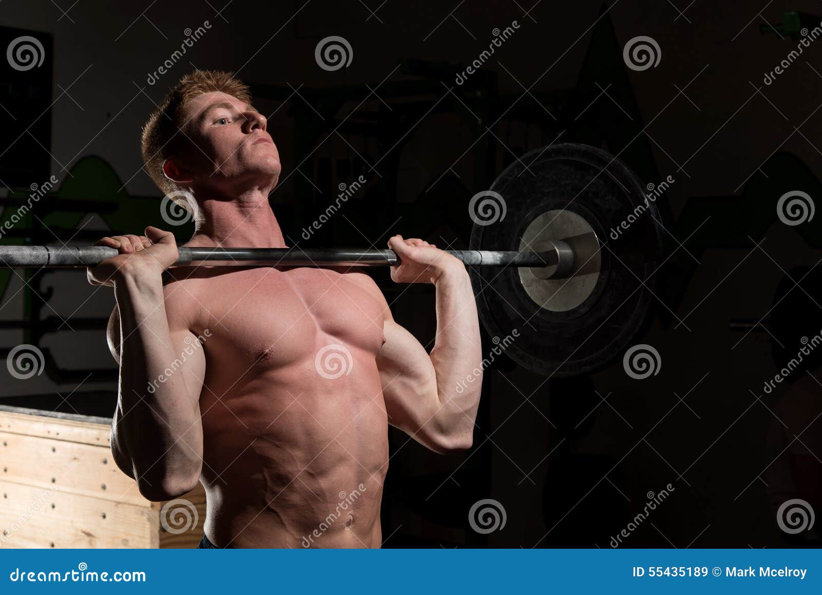 Exercising in Dramatic Light Stock Image - Image of lighting, person ...