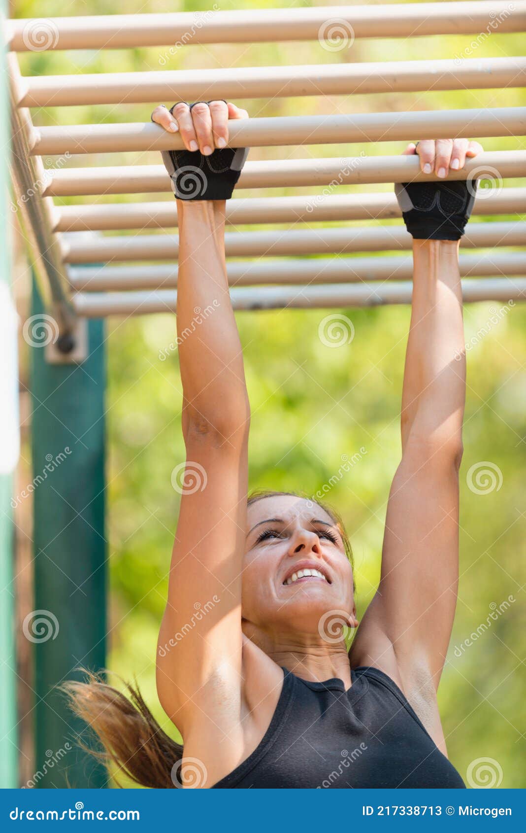 Exercising on monkey bar stock image. Image of fitness - 217338713
