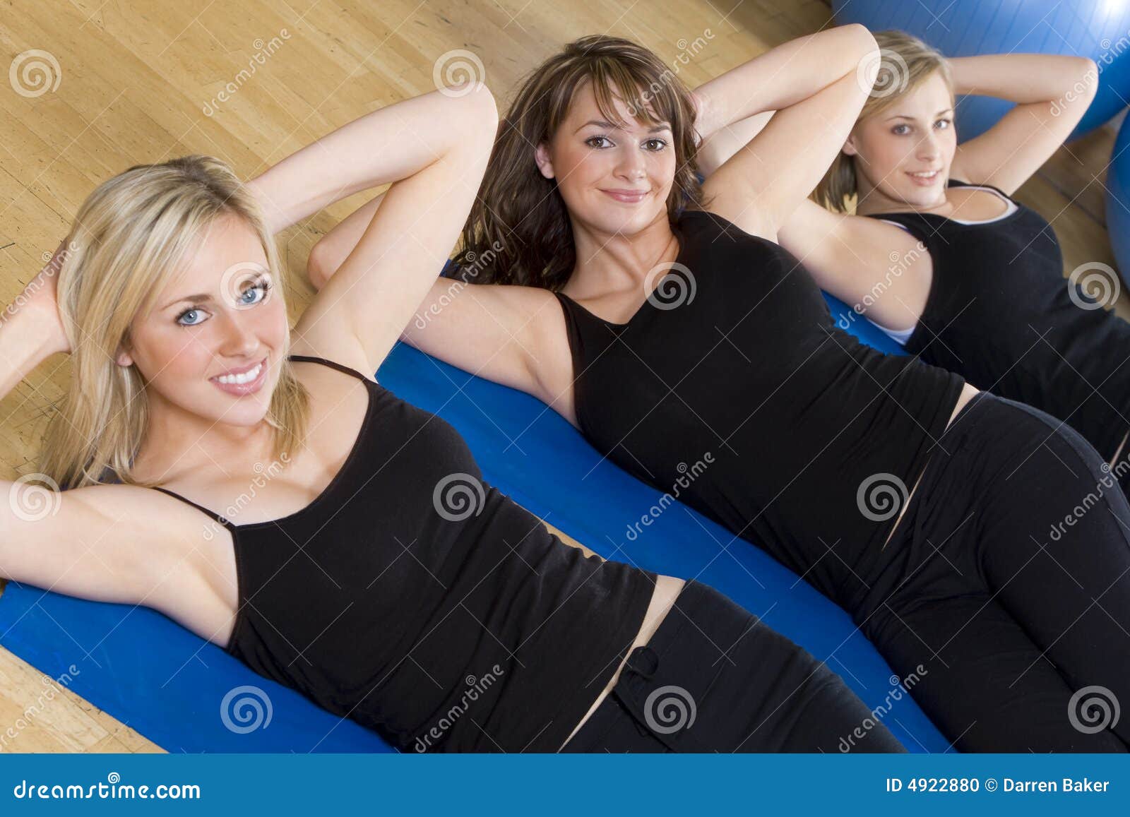 Exercising Trio stock photo. Image of beautiful, blond - 4922880
