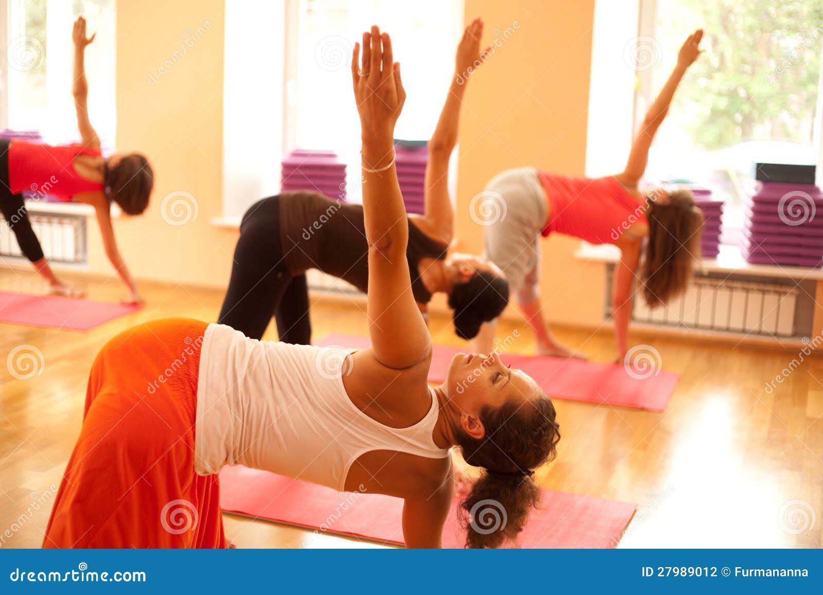 Exercising at yoga class stock photo. Image of health - 27989012