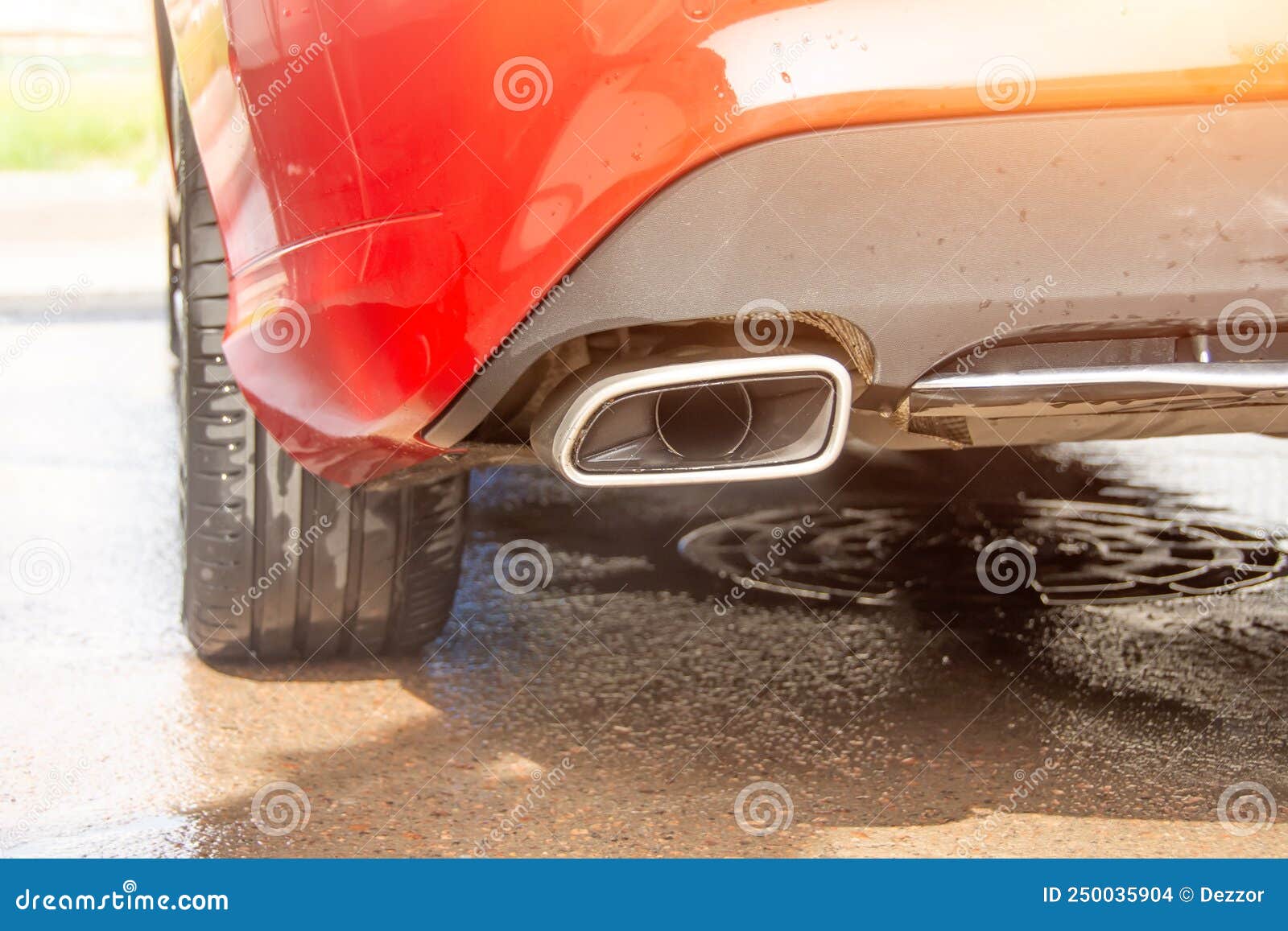 The Exhaust Pipe is Flat Shaped on a Red Car Stock Photo - Image of ...