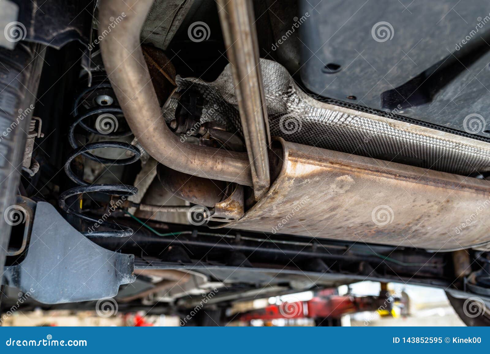 The Exhaust System in the Car Seen from Below, the Car is on the Lift ...