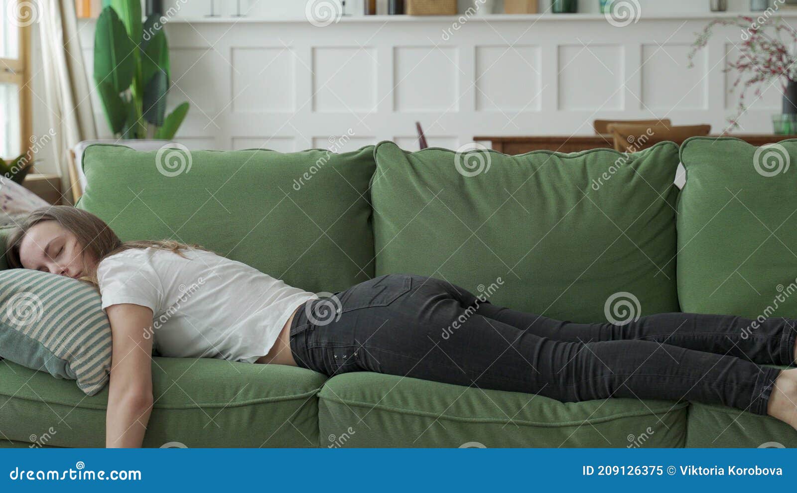Exhausted or Bored Sleepy Woman Falls Down on Sofa. Stock Image - Image ...