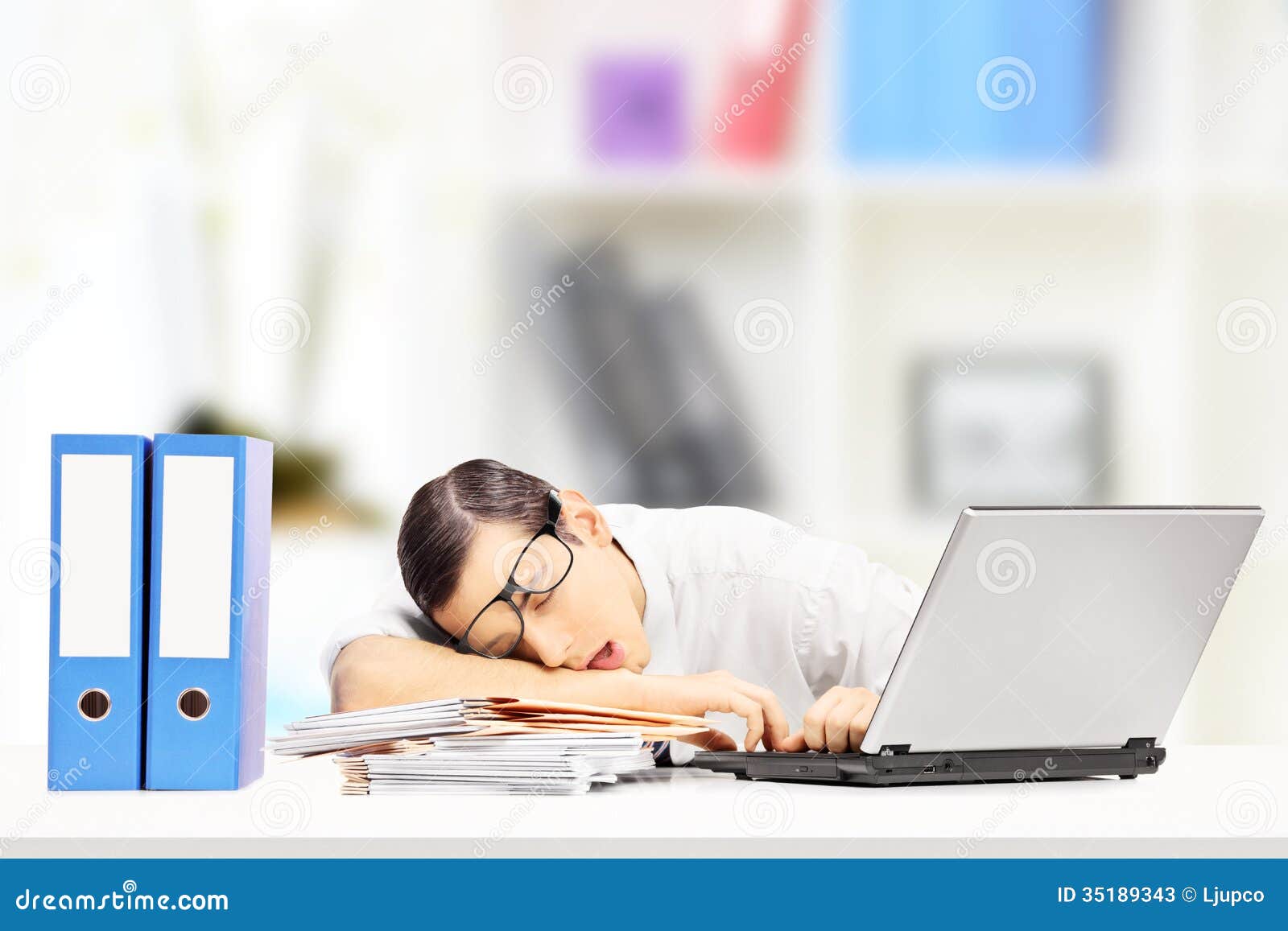 Person Sleeping At Desk