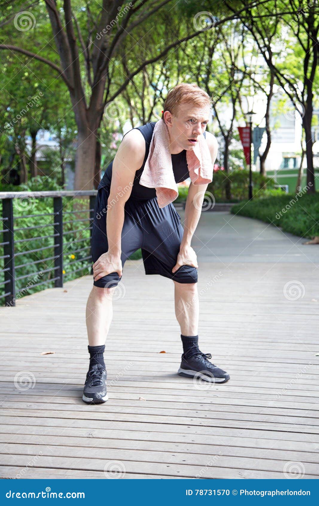 Exhausted Caucasian Man after a Run with Towell Stock Photo - Image of ...