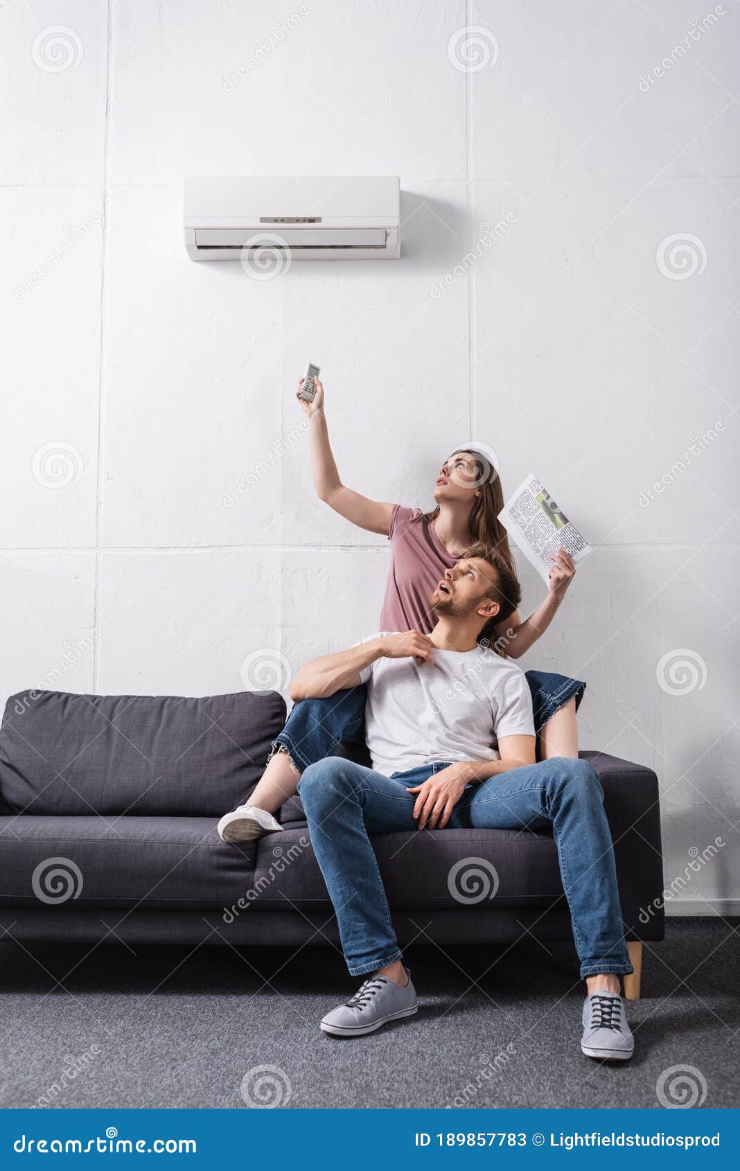 Exhausted Couple with Remote Controller and Stock Image - Image of girl ...