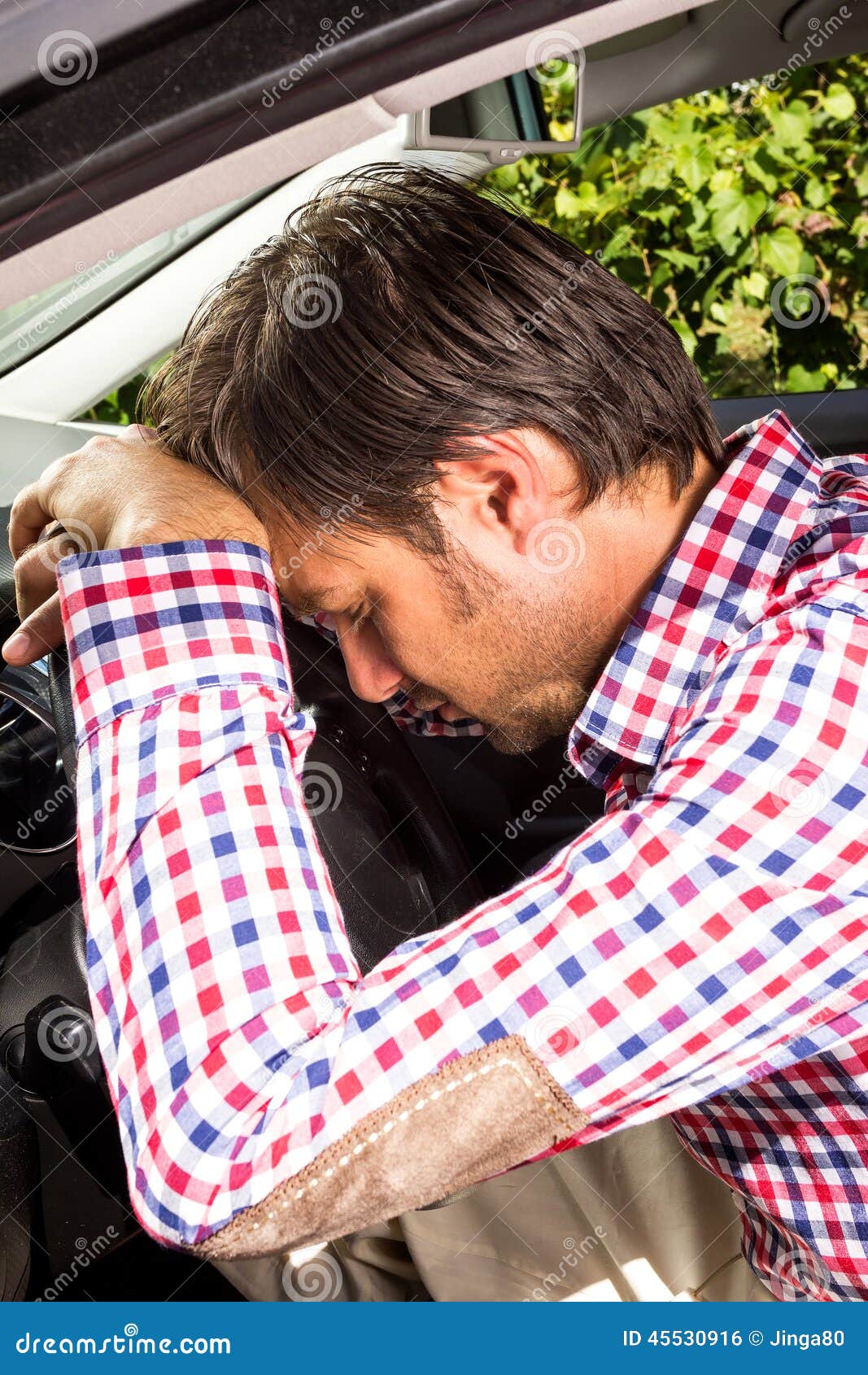 Exhausted Driver Resting on Steering Wheel Stock Photo - Image of ...