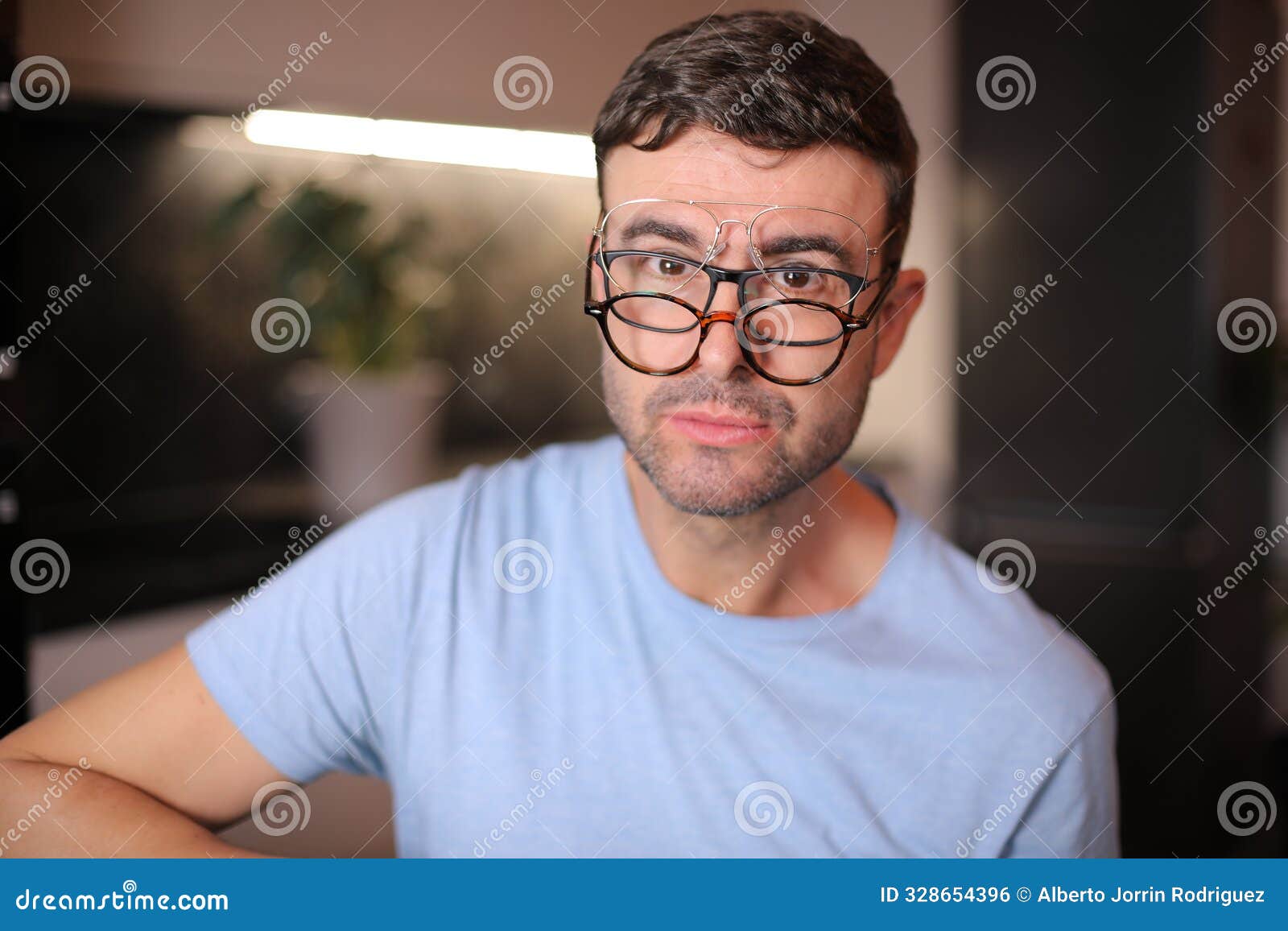 Exhausted Looking Man with Severe Vision Problems Stock Photo - Image ...