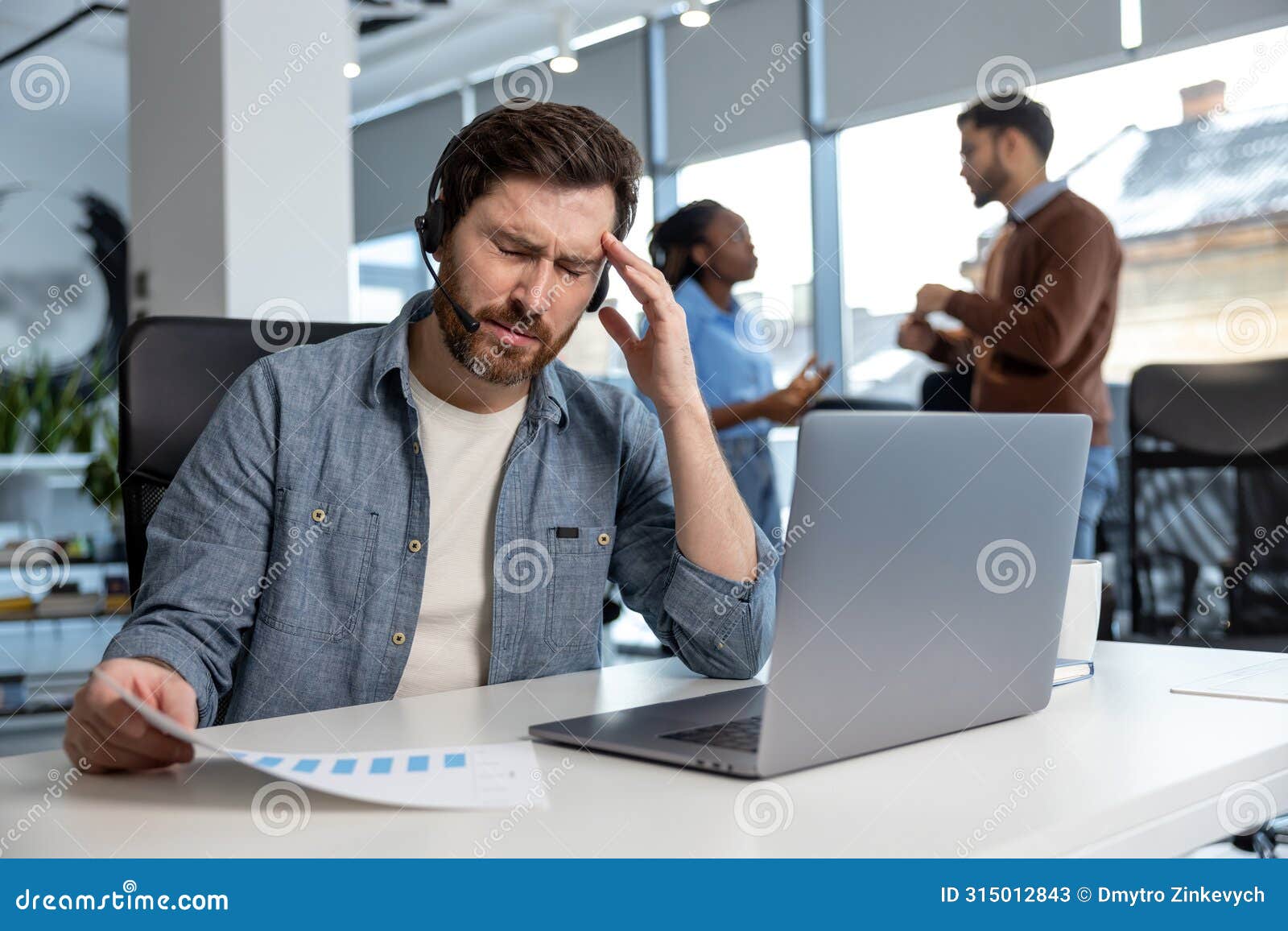 Exhausted Man Call Center Operator Suffering Headache at Workplace ...