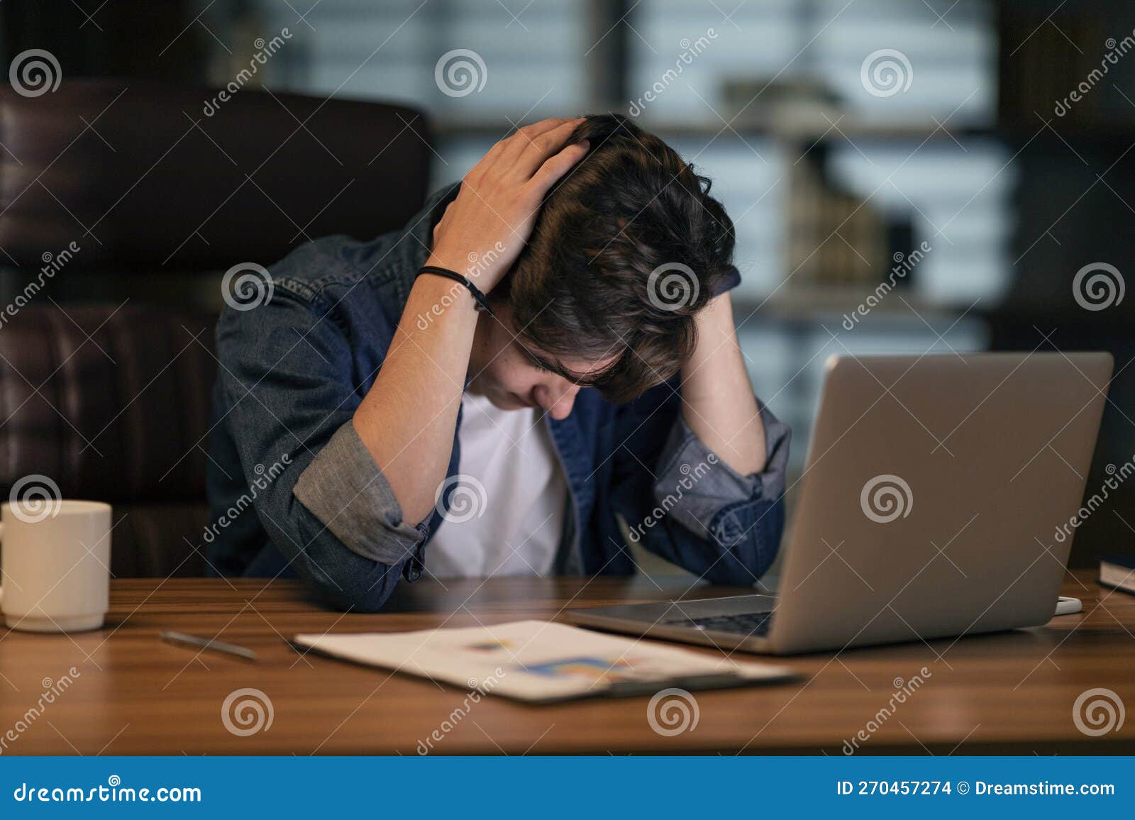 Exhausted Man Sitting in Front of Computer at Dark Office Stock Photo ...