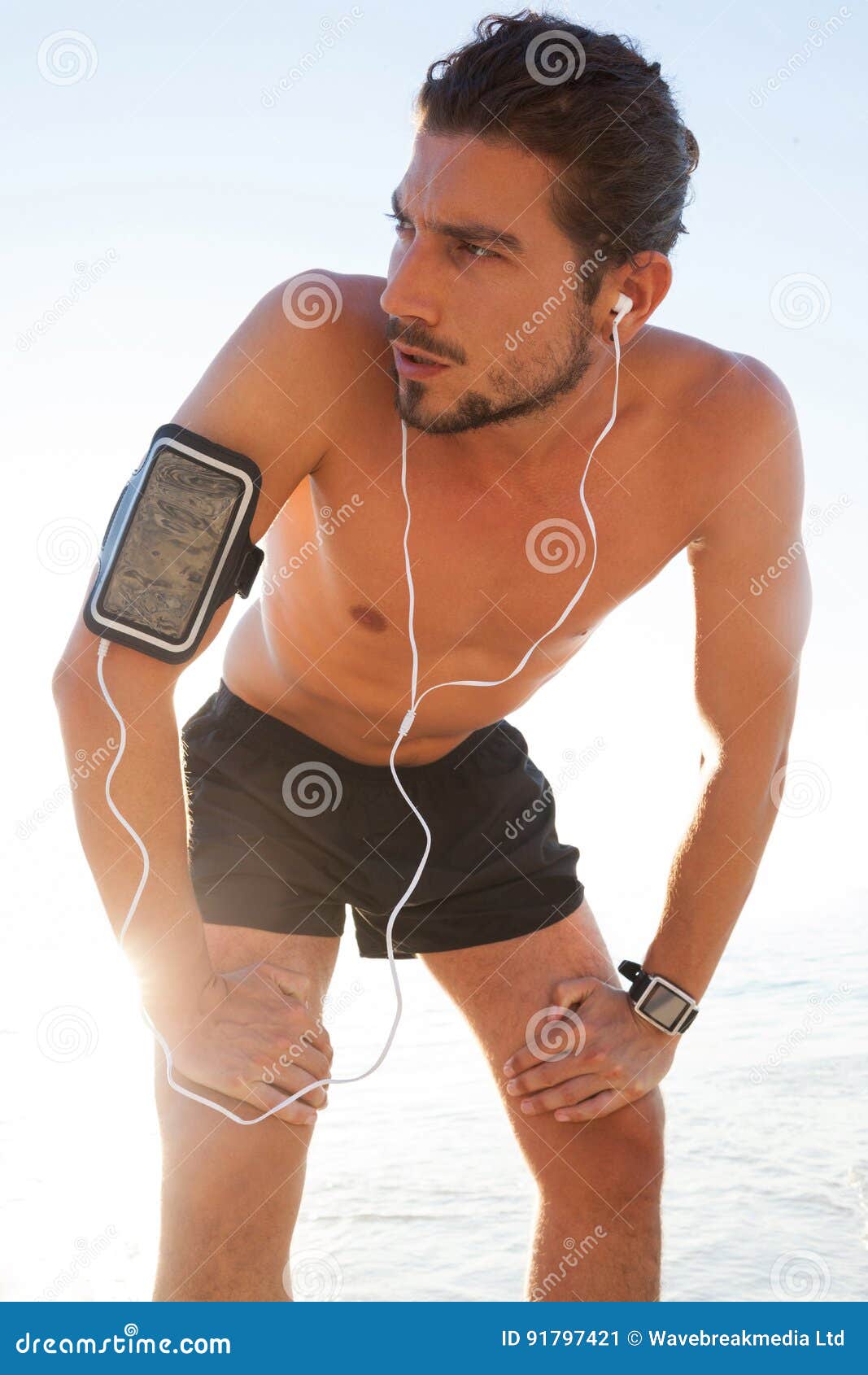 Exhausted Man Taking a Break after Jogging on Beach Stock Image - Image ... Exhausted Man Taking a Break after Jogging on Beach Stock Image - Image ...