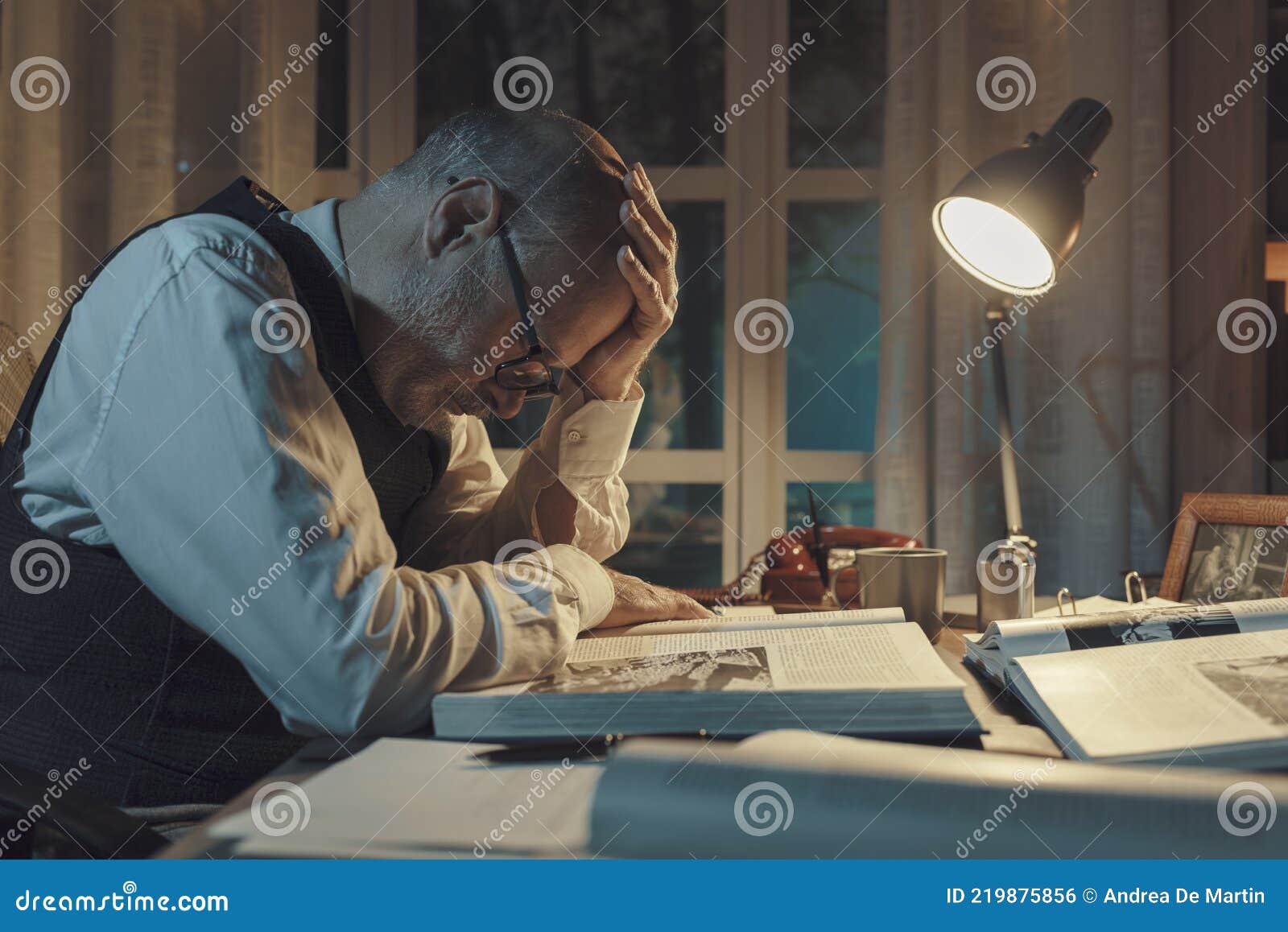 Exhausted Professor Sitting at Desk and Studying Stock Photo - Image of ...