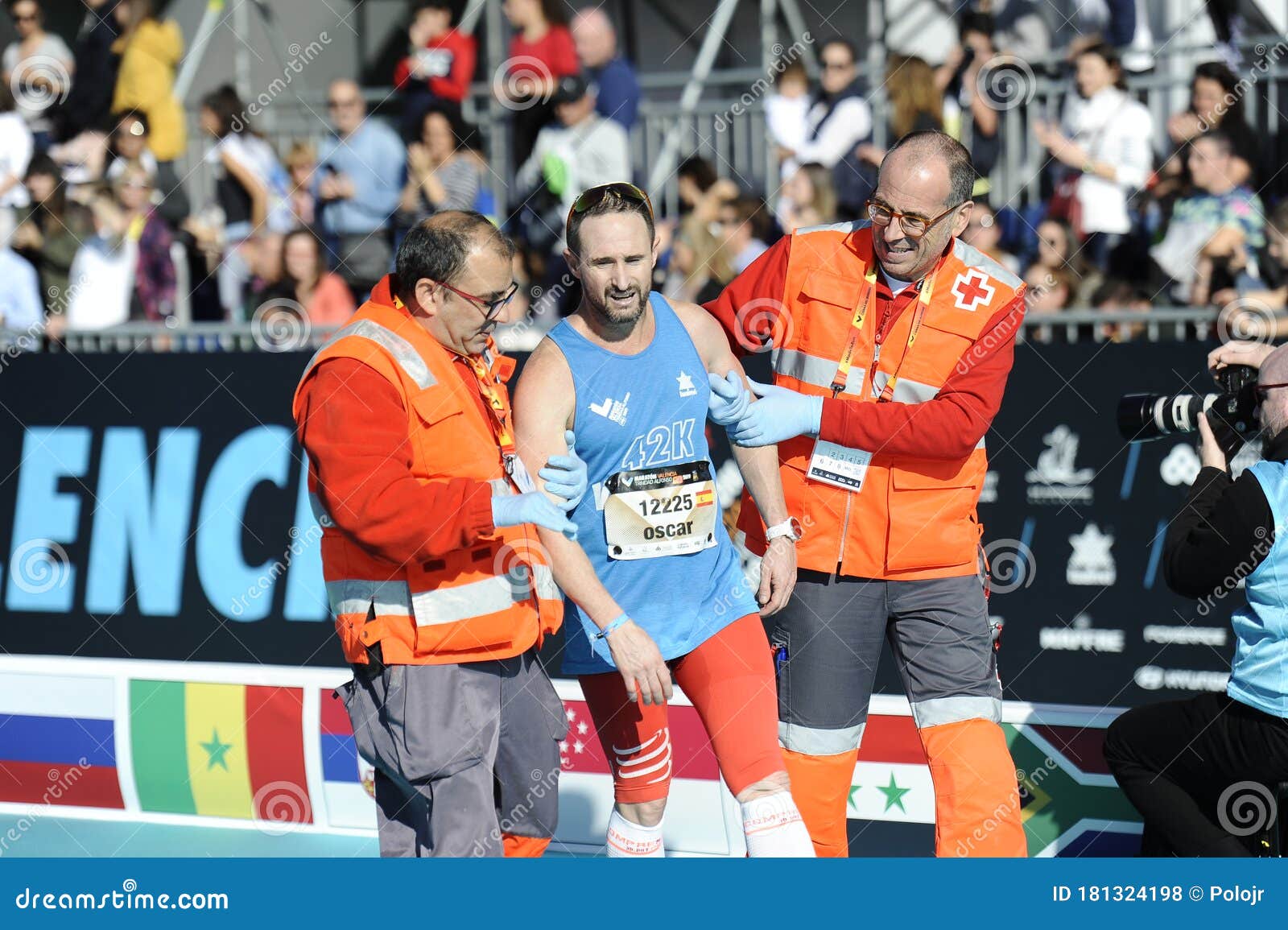 Exhausted Runner At The Finish Line Of The Valencia 2019 Marathon ...