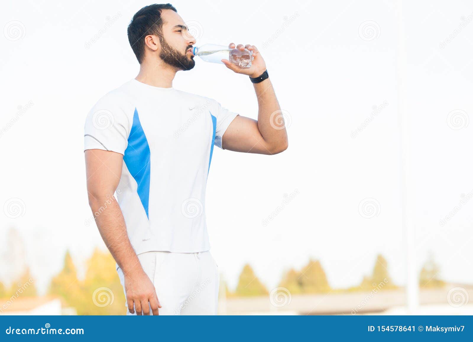 Exhausted Runner Man Drink Water on the Park after Workout Stock Image ...