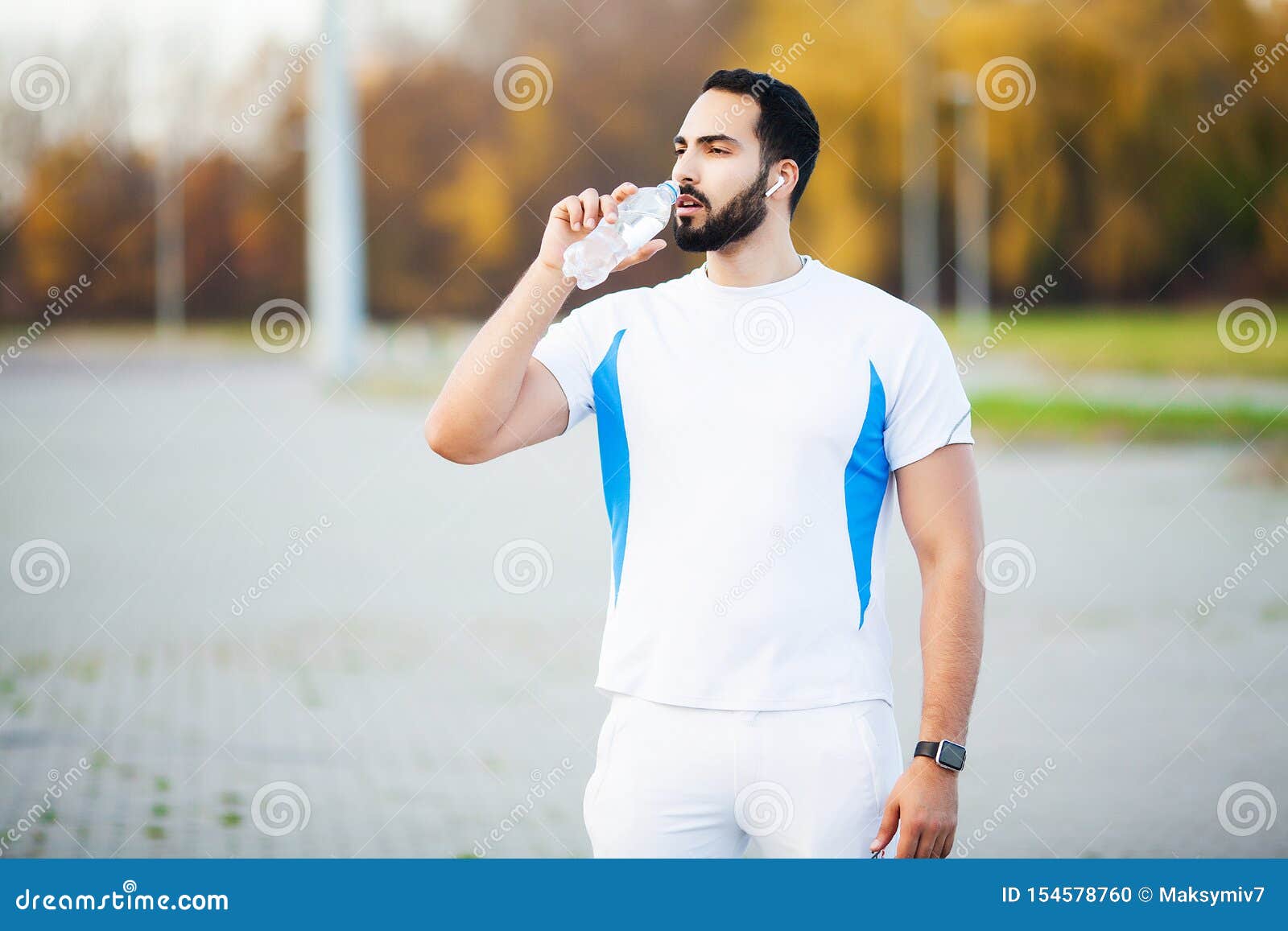 Exhausted Runner Man Drink Water on the Park after Workout Stock Photo ...