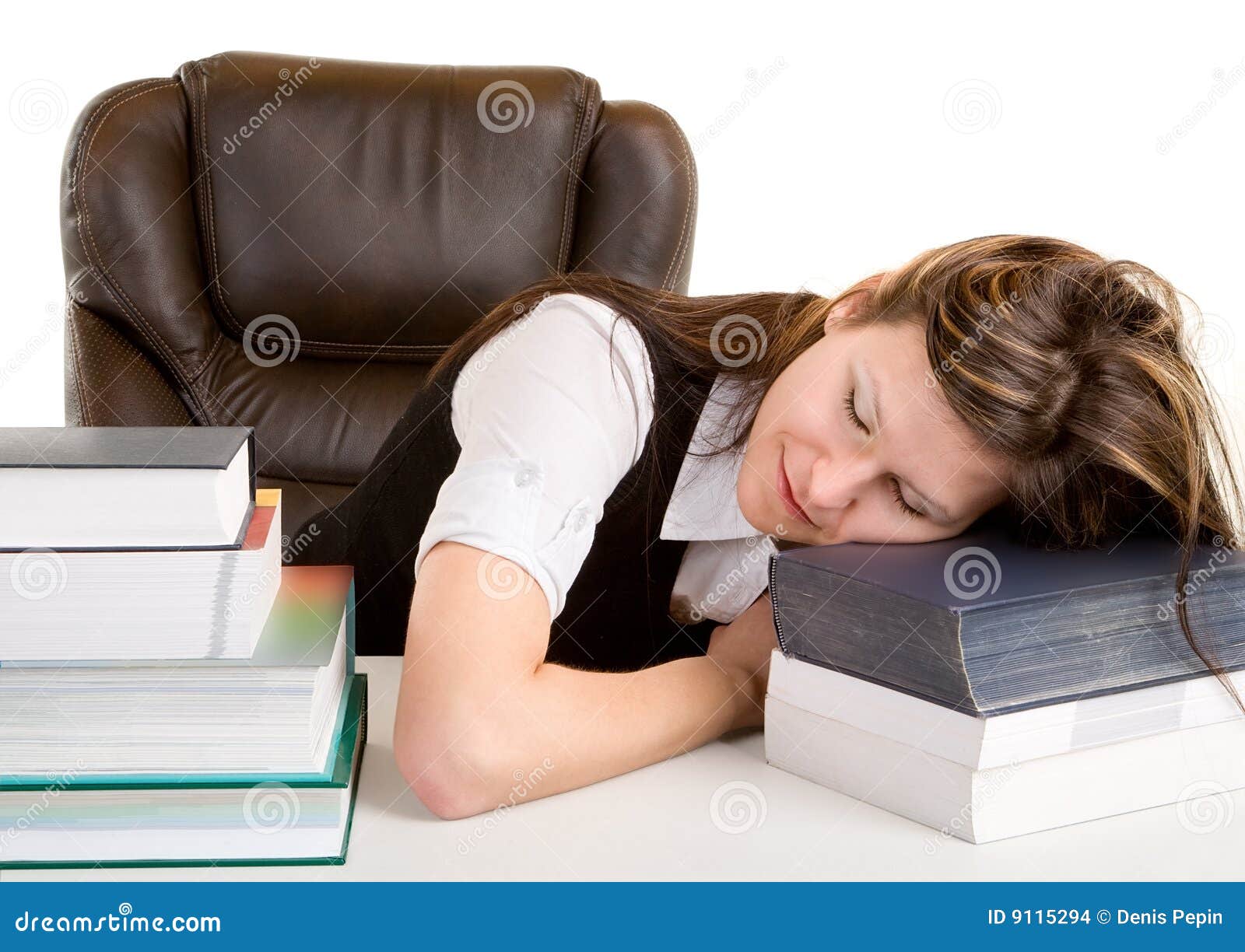 Dozing Student Sitting On Library Floor Leaning On Pile Of Books ...