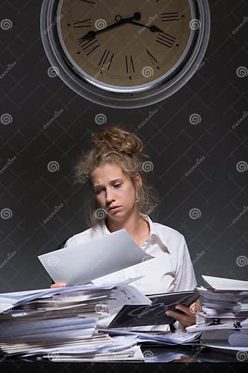 Exhausted Worker Doing Paperwork Stock Image - Image of female ...