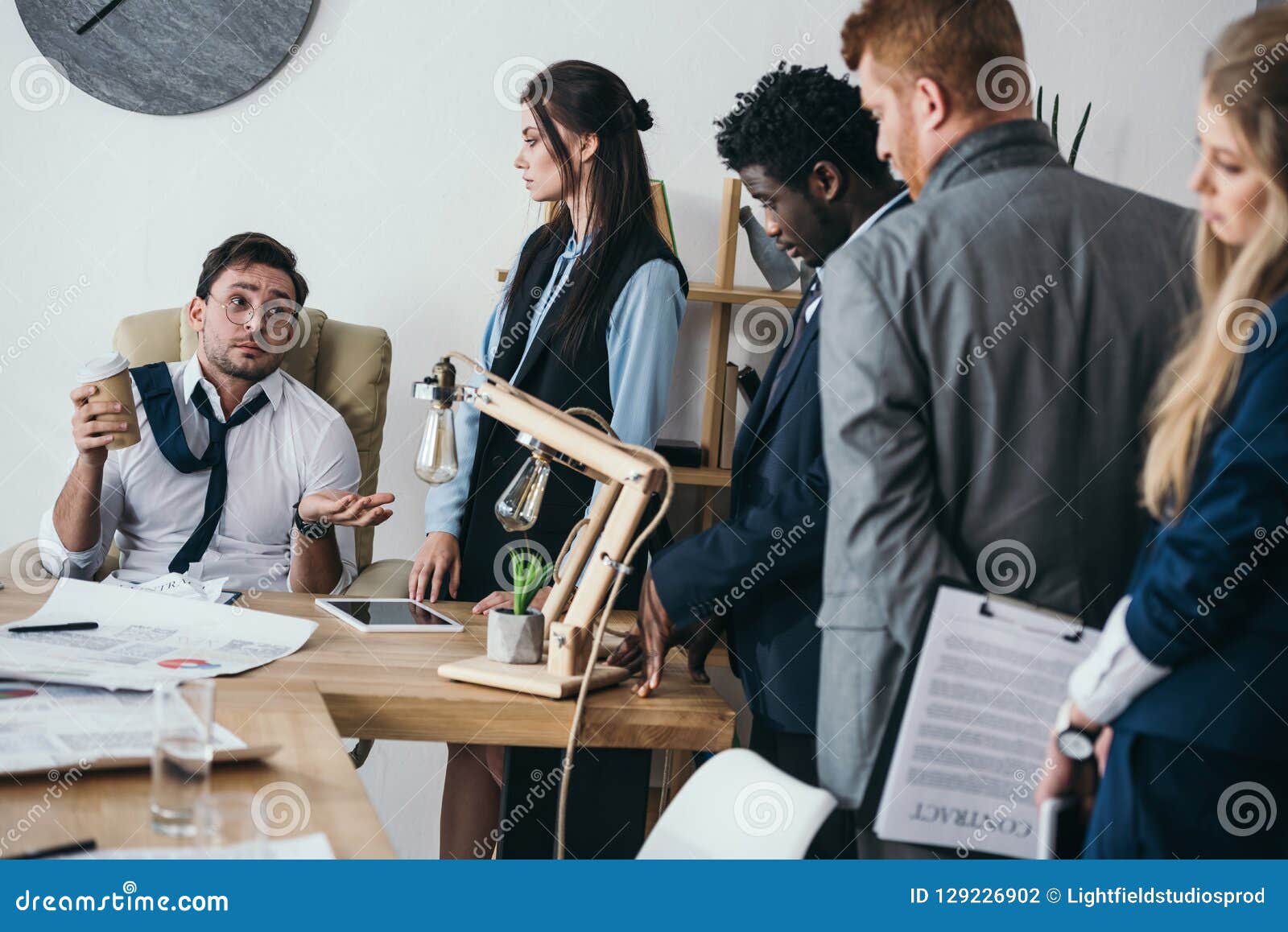 Exhausted Zombie Like Businesspeople Talking To Boss Stock Photo ... Exhausted Zombie Like Businesspeople Talking To Boss Stock Photo ...