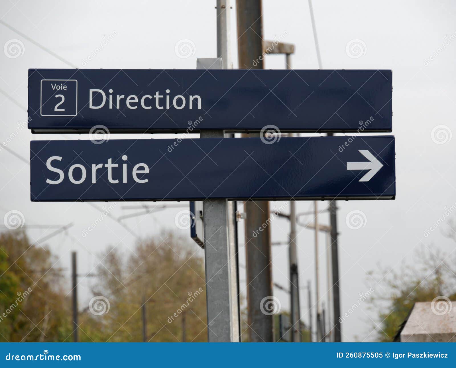 Exit and Direction Signs Near a Train Station. Stock Image - Image of ...