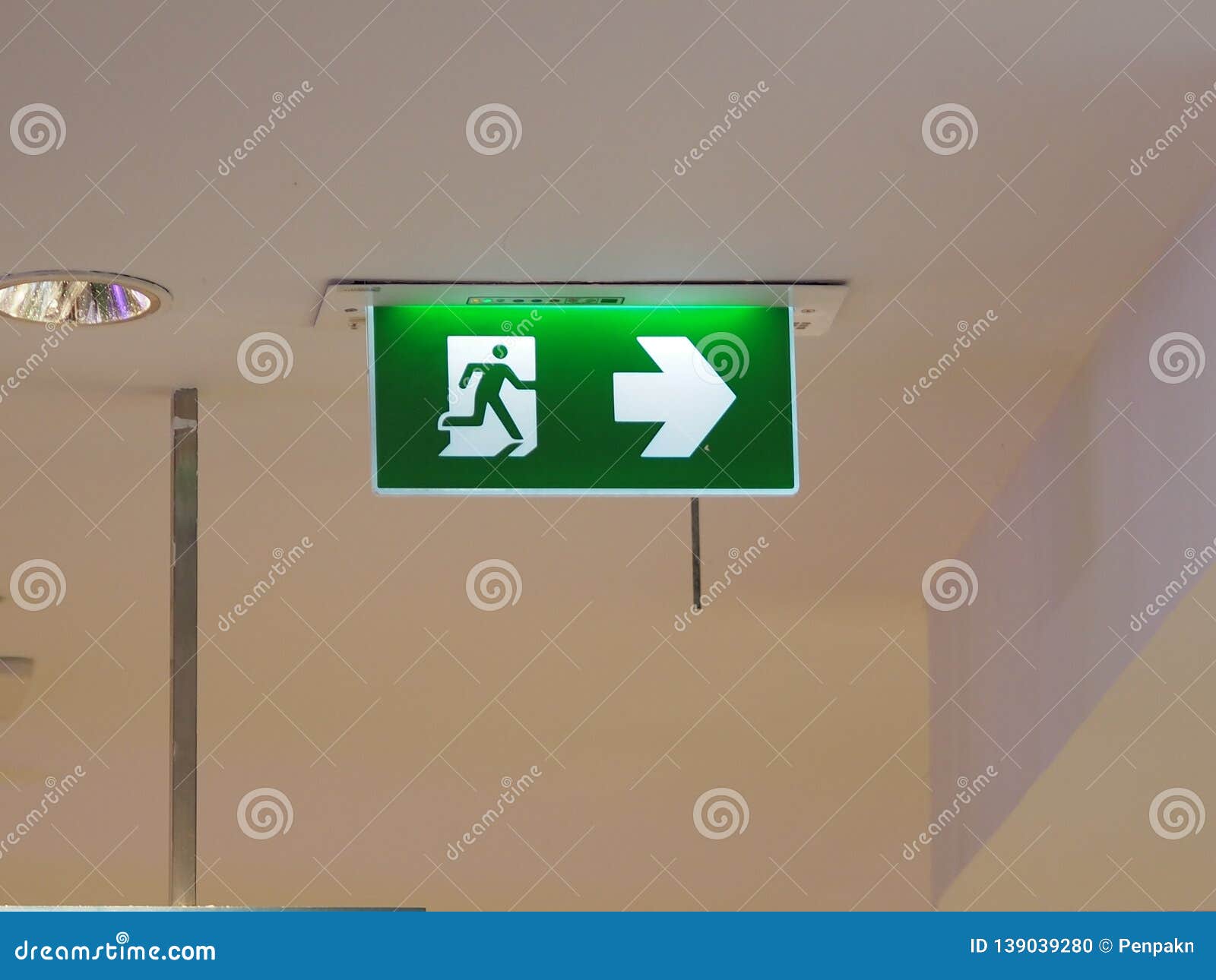 Exit Fire Sign on Ceiling Direct Symbol Way Run To Door Stock Photo ...