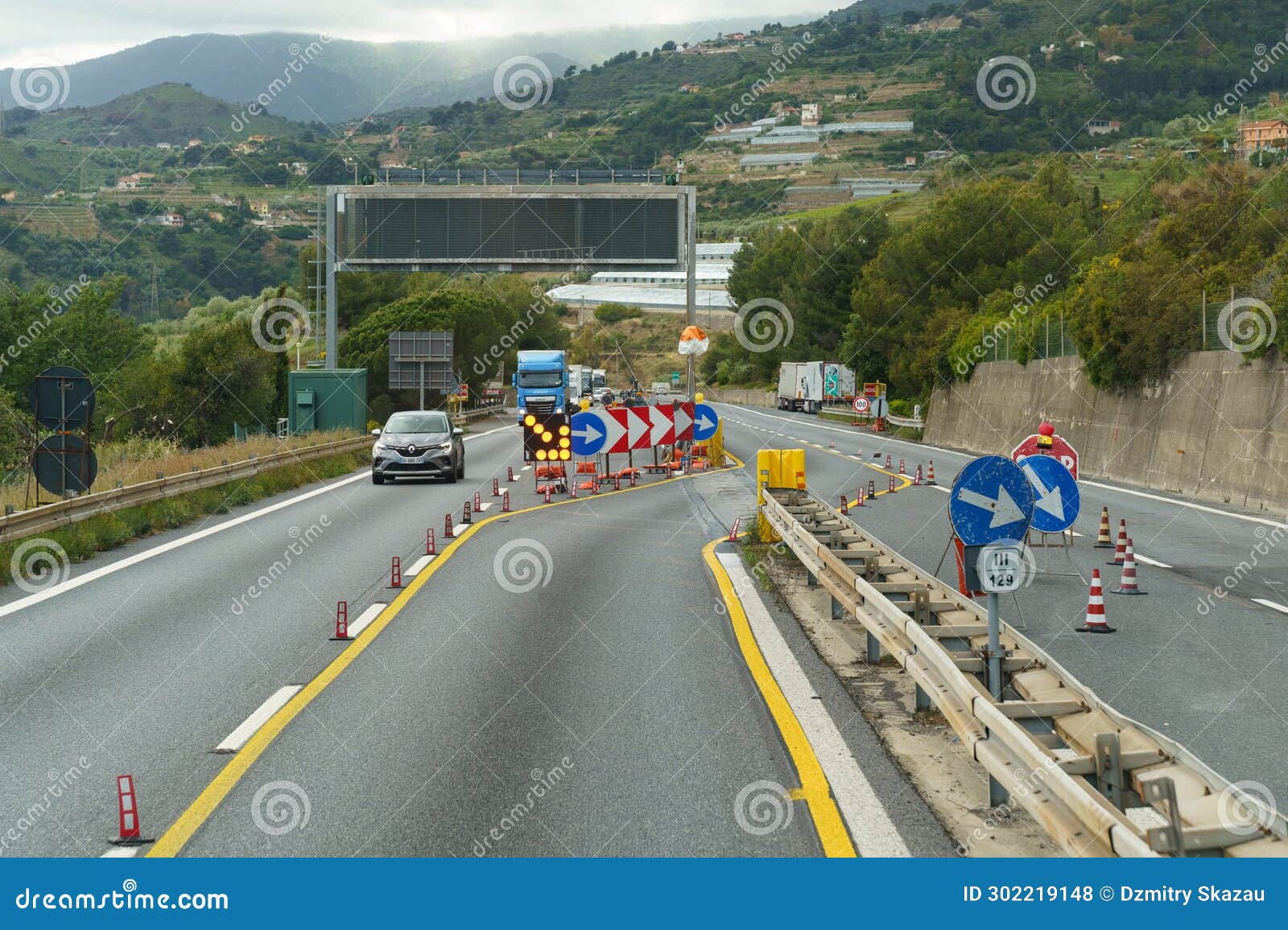 Exit from the Road Section Being Repaired, Road Signs Indicating the ...