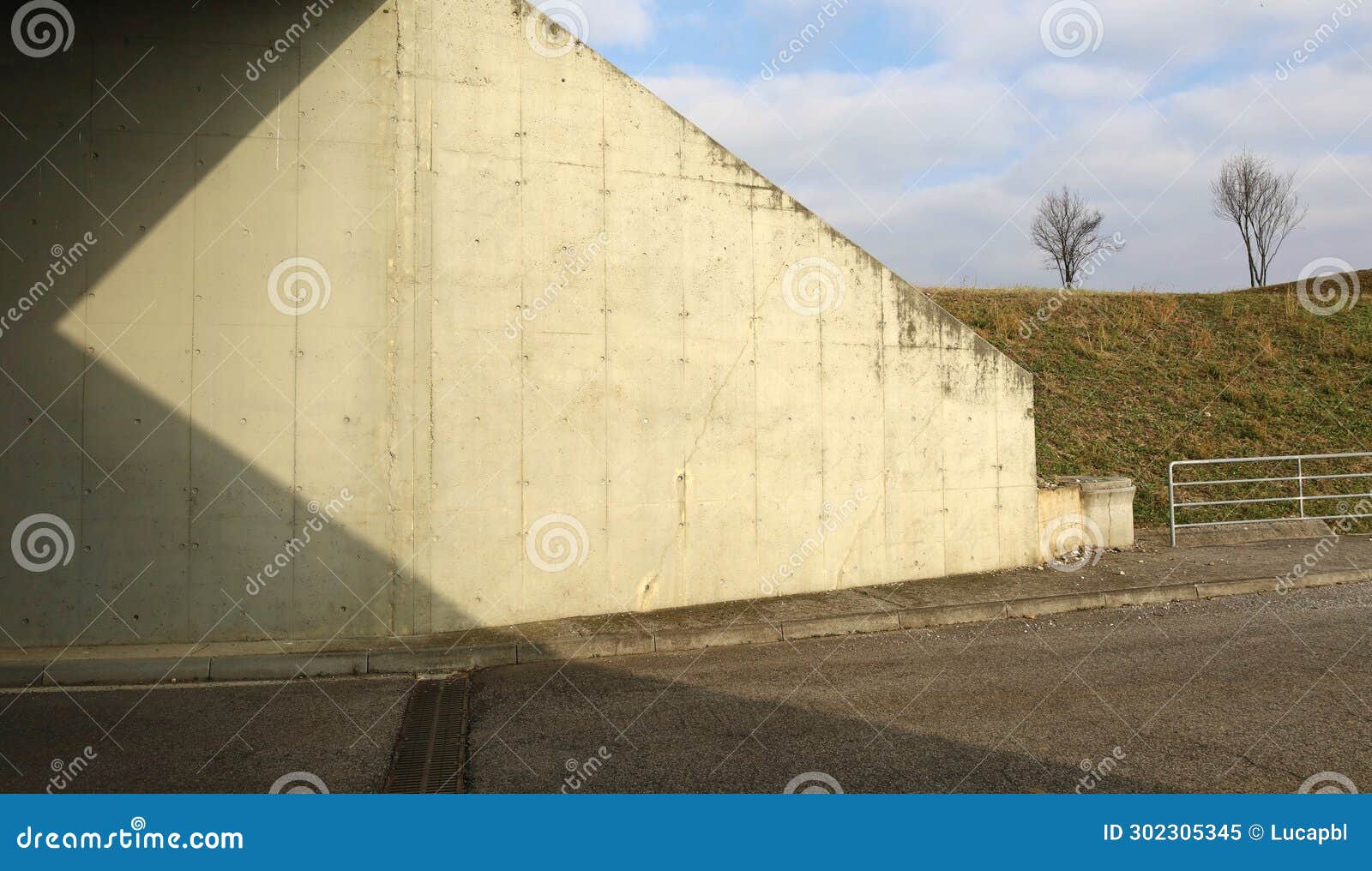 Exit of a Road Underpass Made of Concrete with Grass, Trees and Cloudy ...