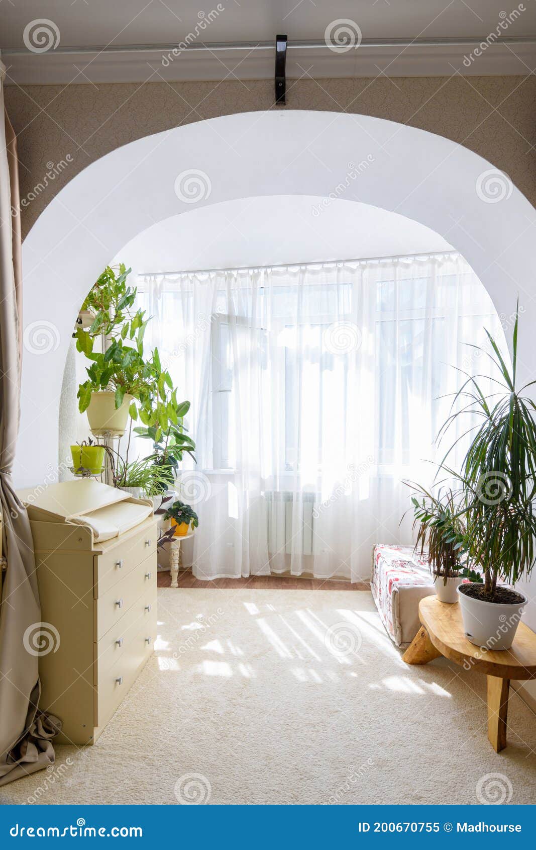 Exit from the Room in the Form of an Arch To a Spacious Glazed Balcony ...