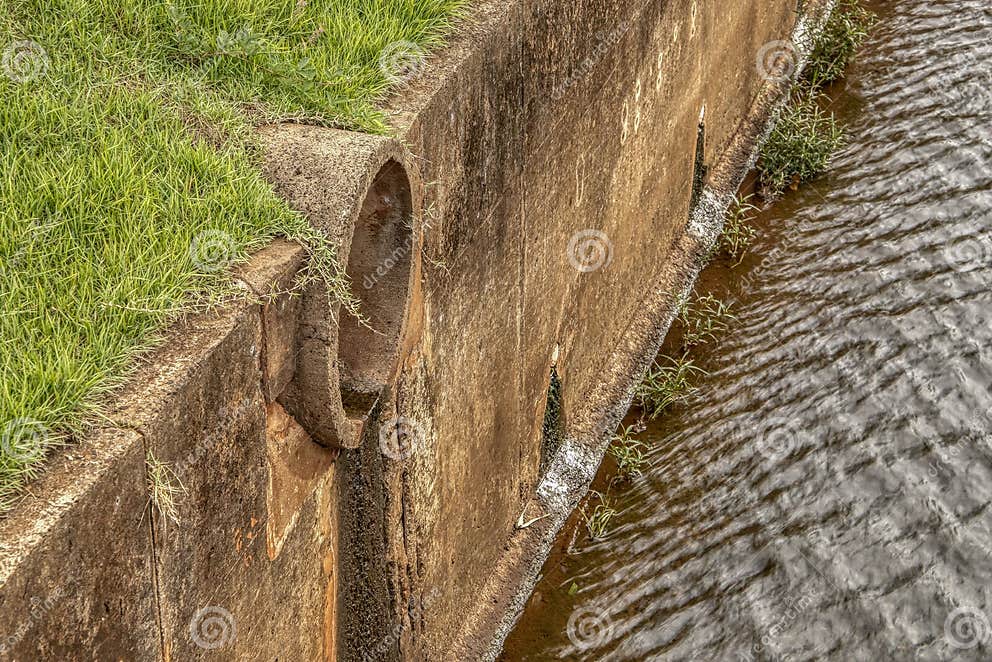 Exit of sewer pipe stock photo. Image of concrete, dirty - 205976718