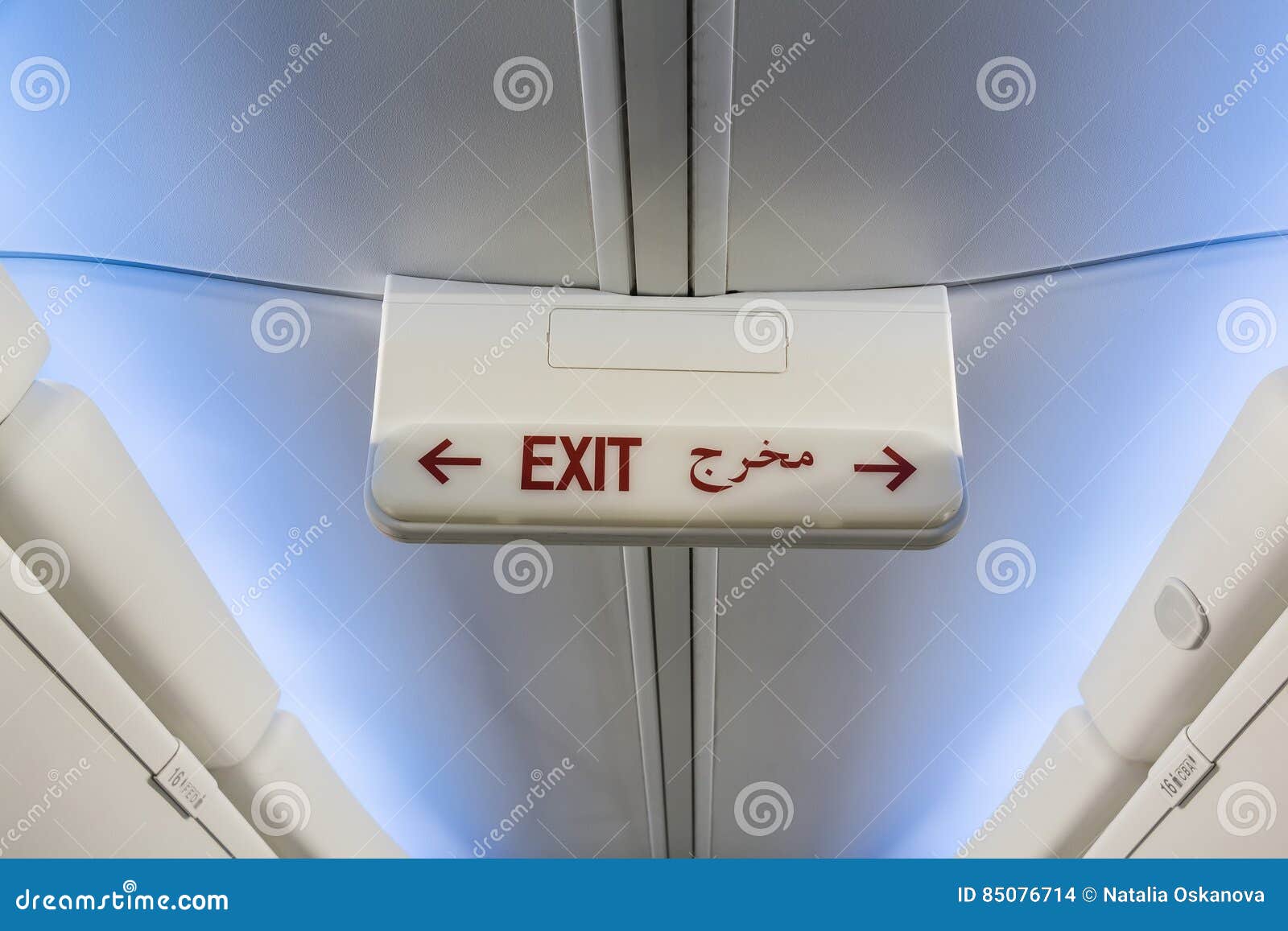 Exit sign in airliner stock photo. Image of leaving, airport - 85076714