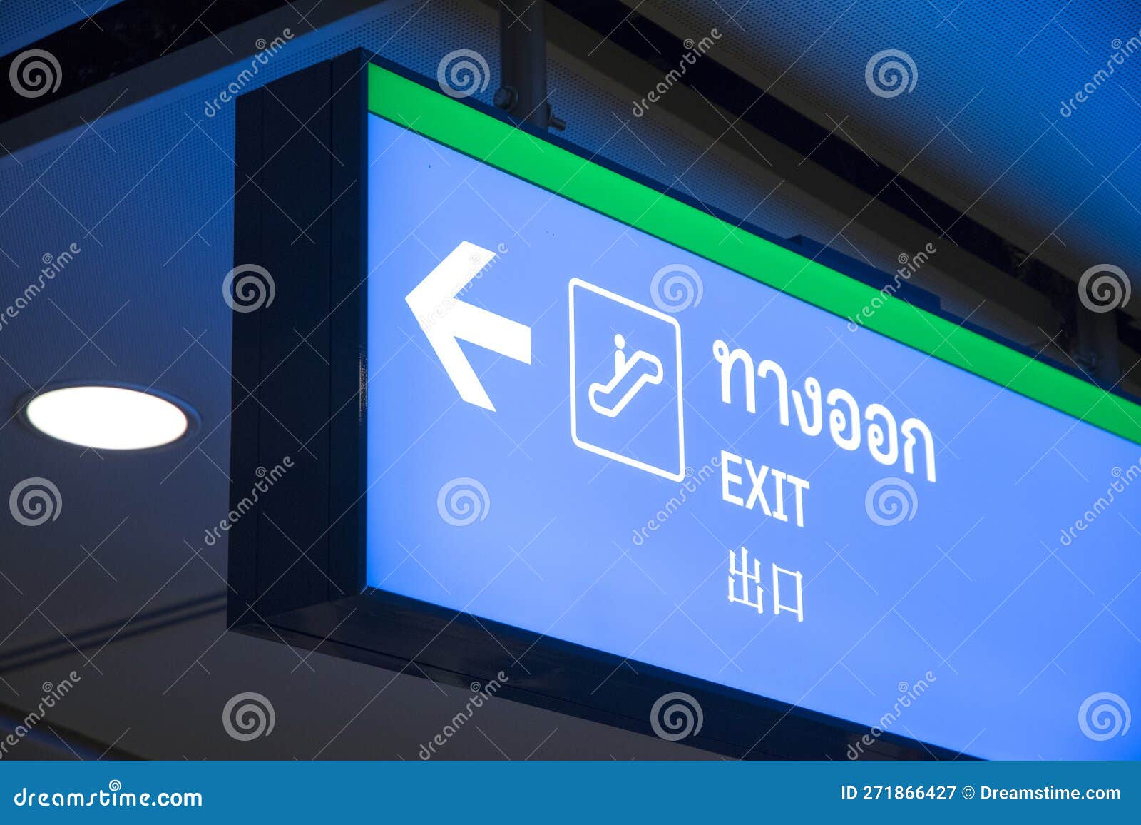 Exit Sign with Chinese, Thai and English Languages Stock Image - Image ...