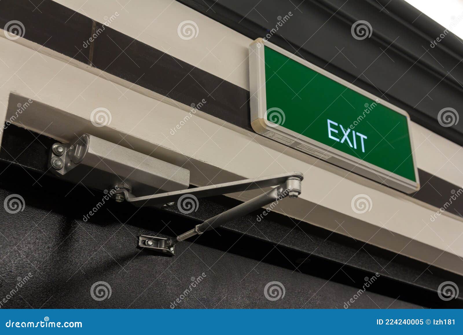 Exit Sign on the Door. Close Up Exit Sign on Door in the Building ...