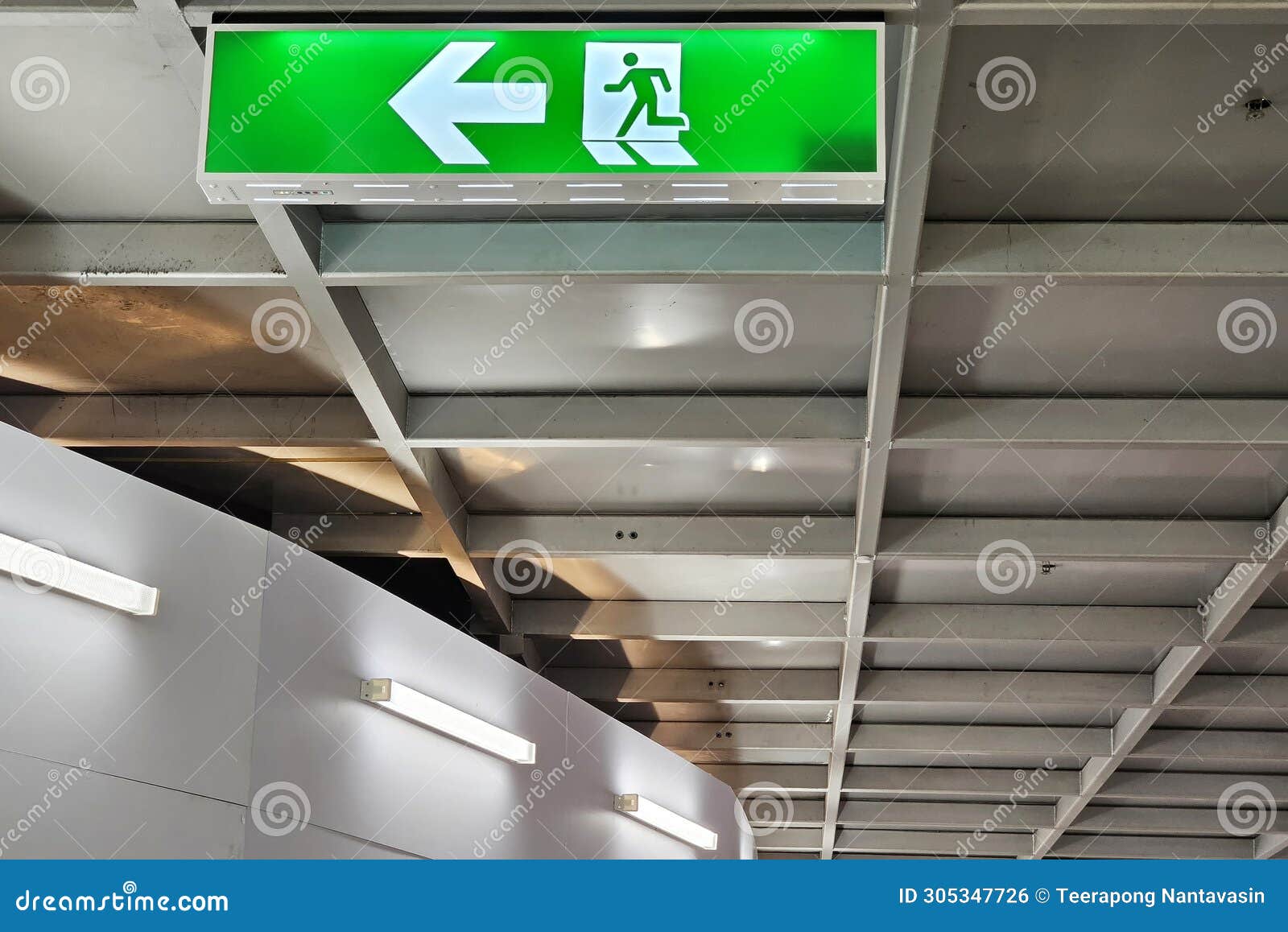 Exit Sign Hanging on the Ceiling. Stock Photo - Image of hotel ...