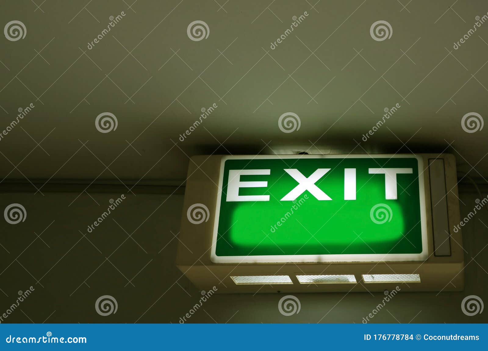 Exit Sign Hanging on the Ceiling with Copy Space Stock Photo - Image of ...