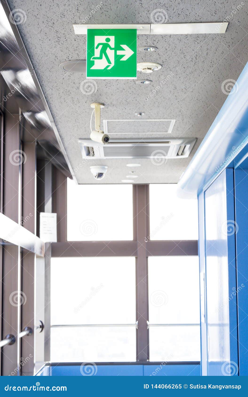 Exit Sign Lignt with Cctv and Camera Under Ceiling for Security Stock ...