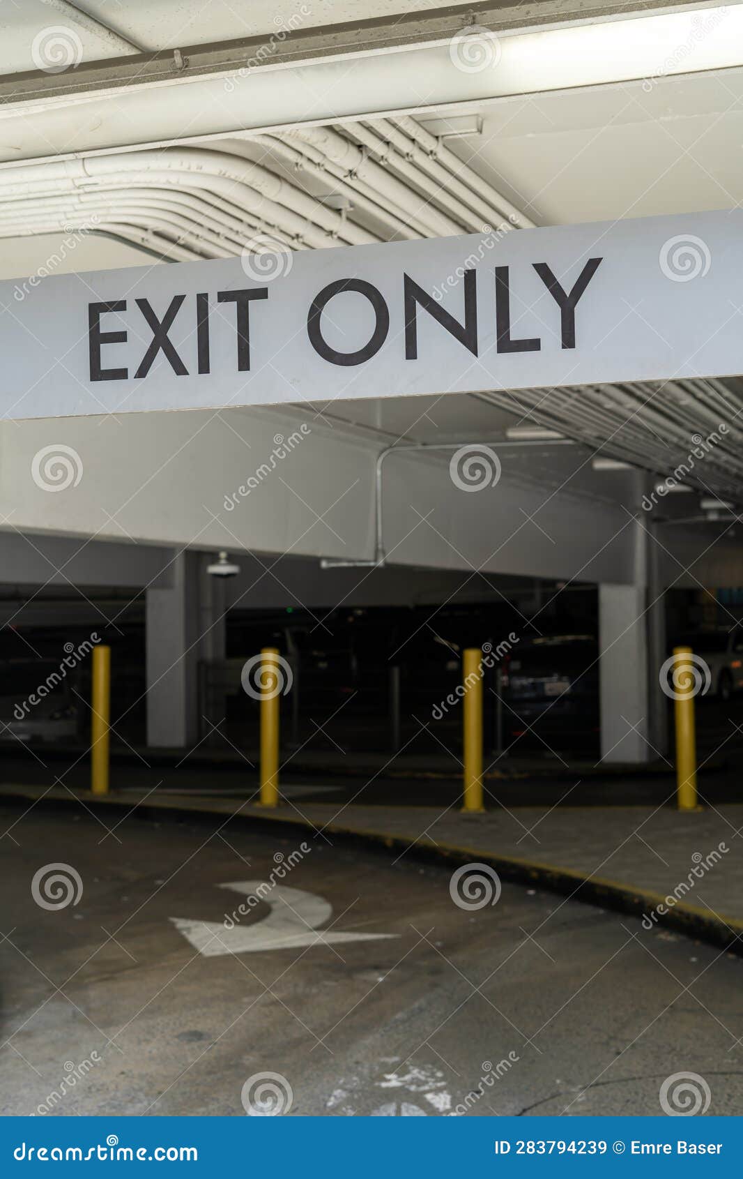 Exit only Sign in a Parking Garage Stock Image - Image of people ...