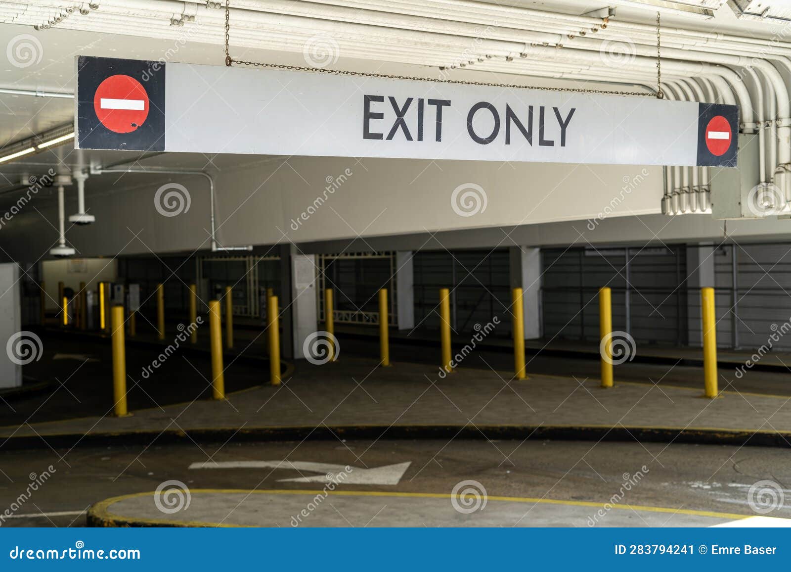Exit only Sign on a Parking Garage Stock Image - Image of enter ...