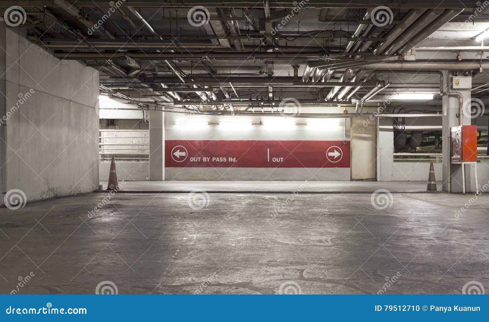 Exit Sign in Parking Garage Interior, Industrial Building. Stock Photo ...