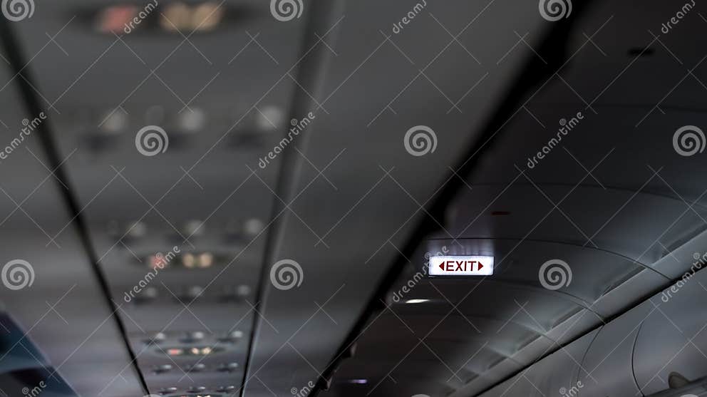 Exit Sign in Passenger Airplane. Emergency Exit Sign on Airplane Stock ... Exit Sign in Passenger Airplane. Emergency Exit Sign on Airplane Stock ...