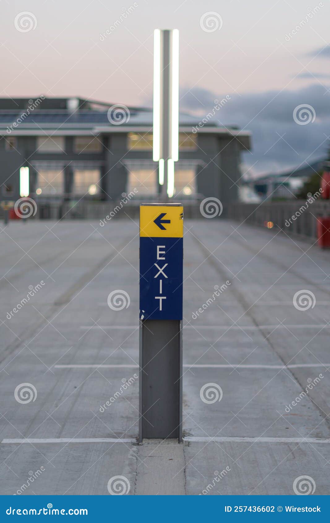 Exit Sign Showing the Way To Exit the Parking Place Stock Photo - Image ...